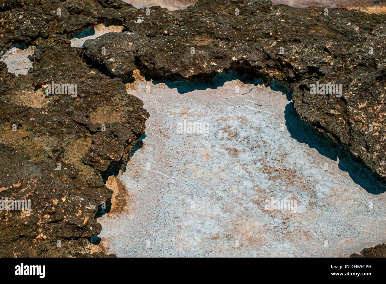 salt crystals on limestone rock, Blue Lagoon, Camino island, Malta ...