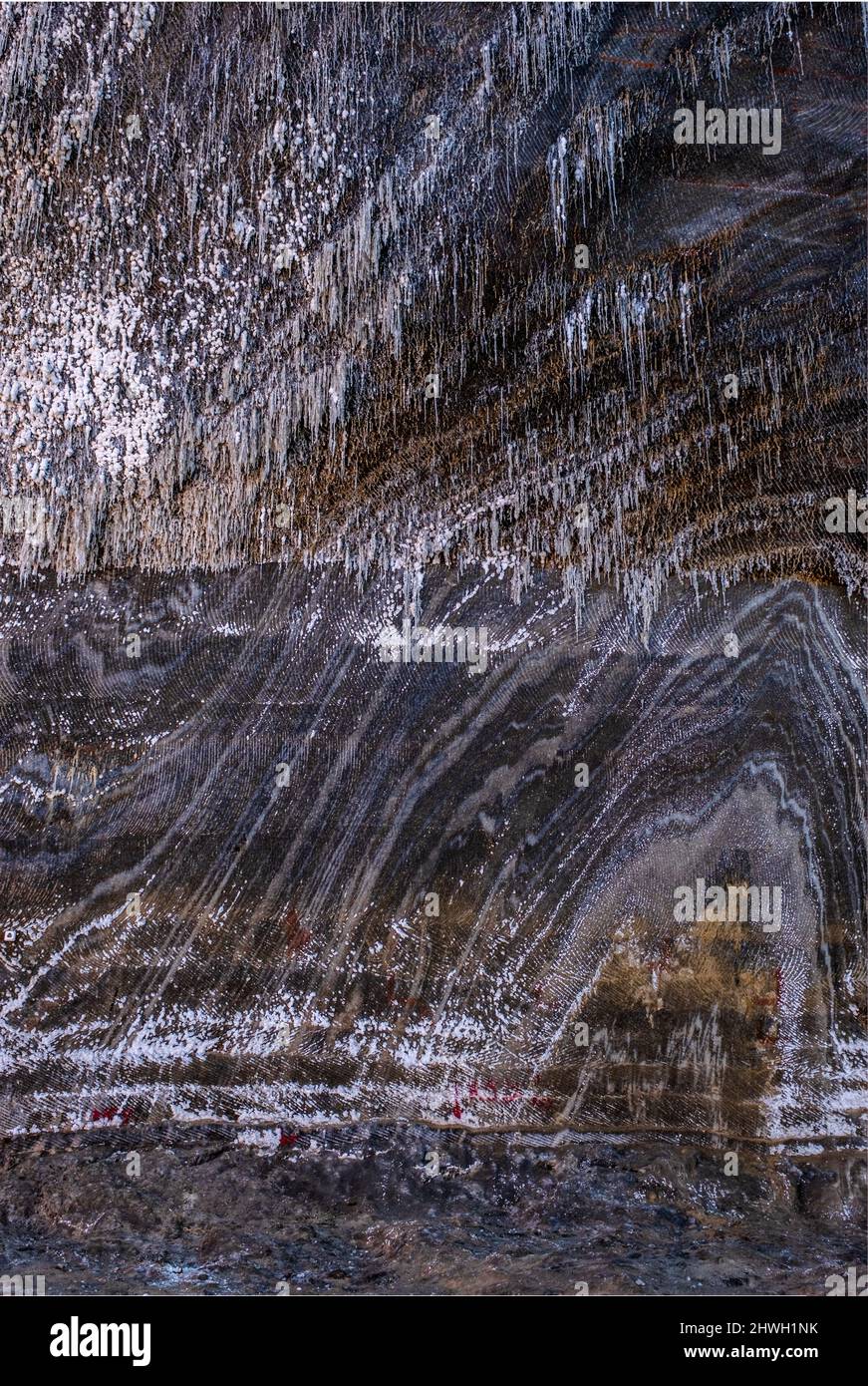 Vault of gallery with salt stalactites in Salina Turda salt mine ...