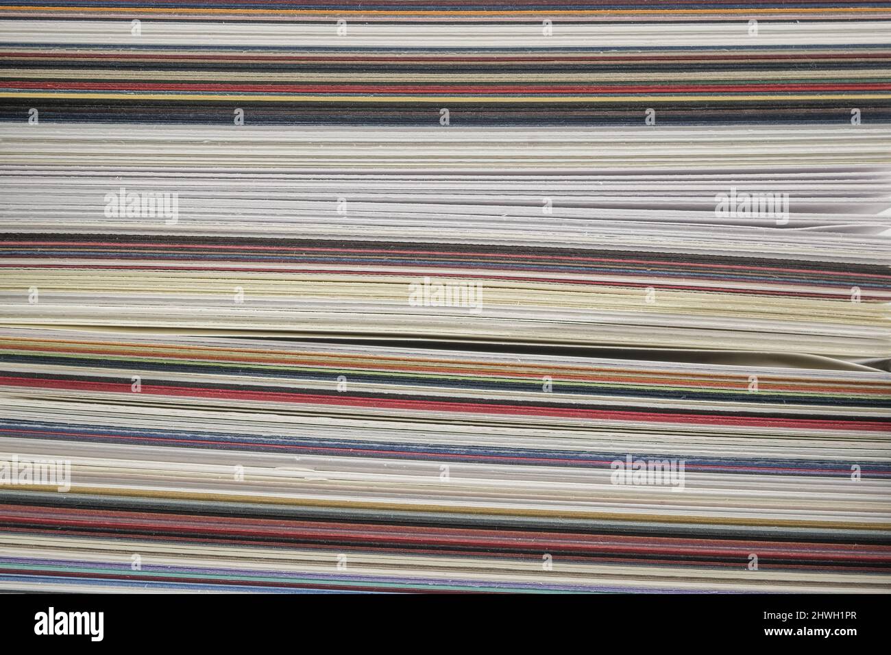 Stack of papers colour background hi-res stock photography and images ...