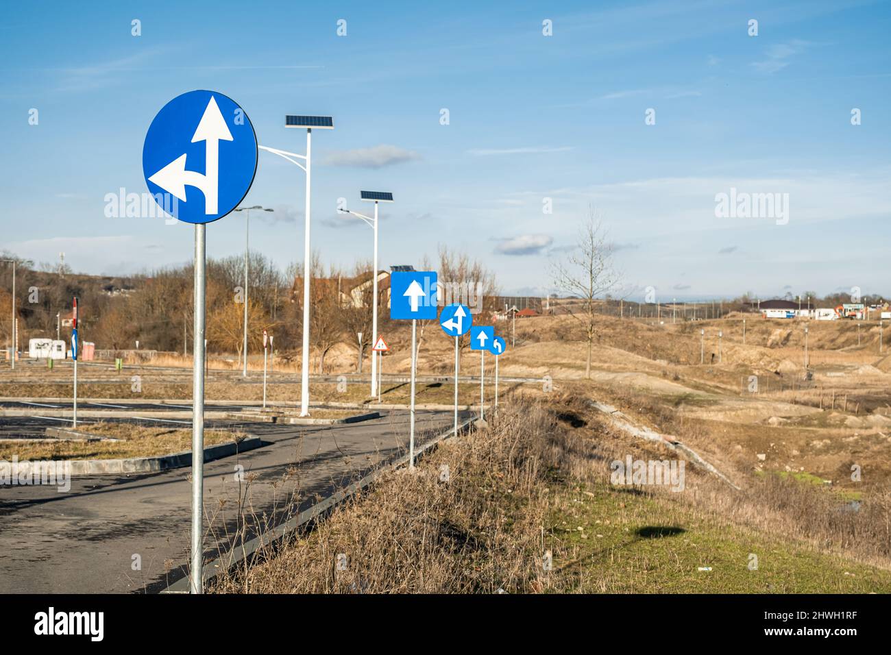 traffic signs on the side of the road Stock Photo - Alamy