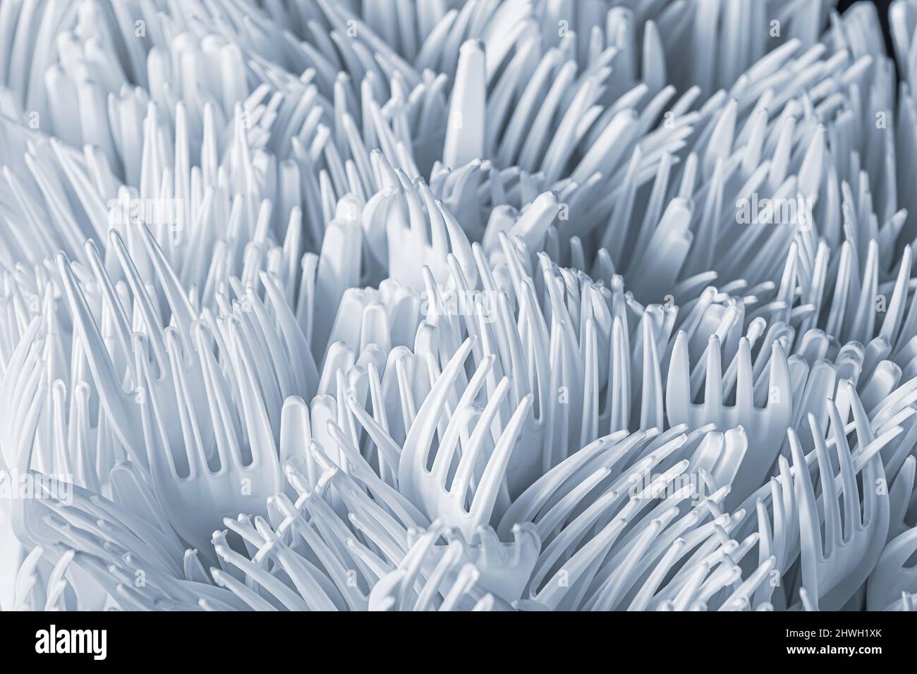 white plastic fork for background or texture Stock Photo - Alamy