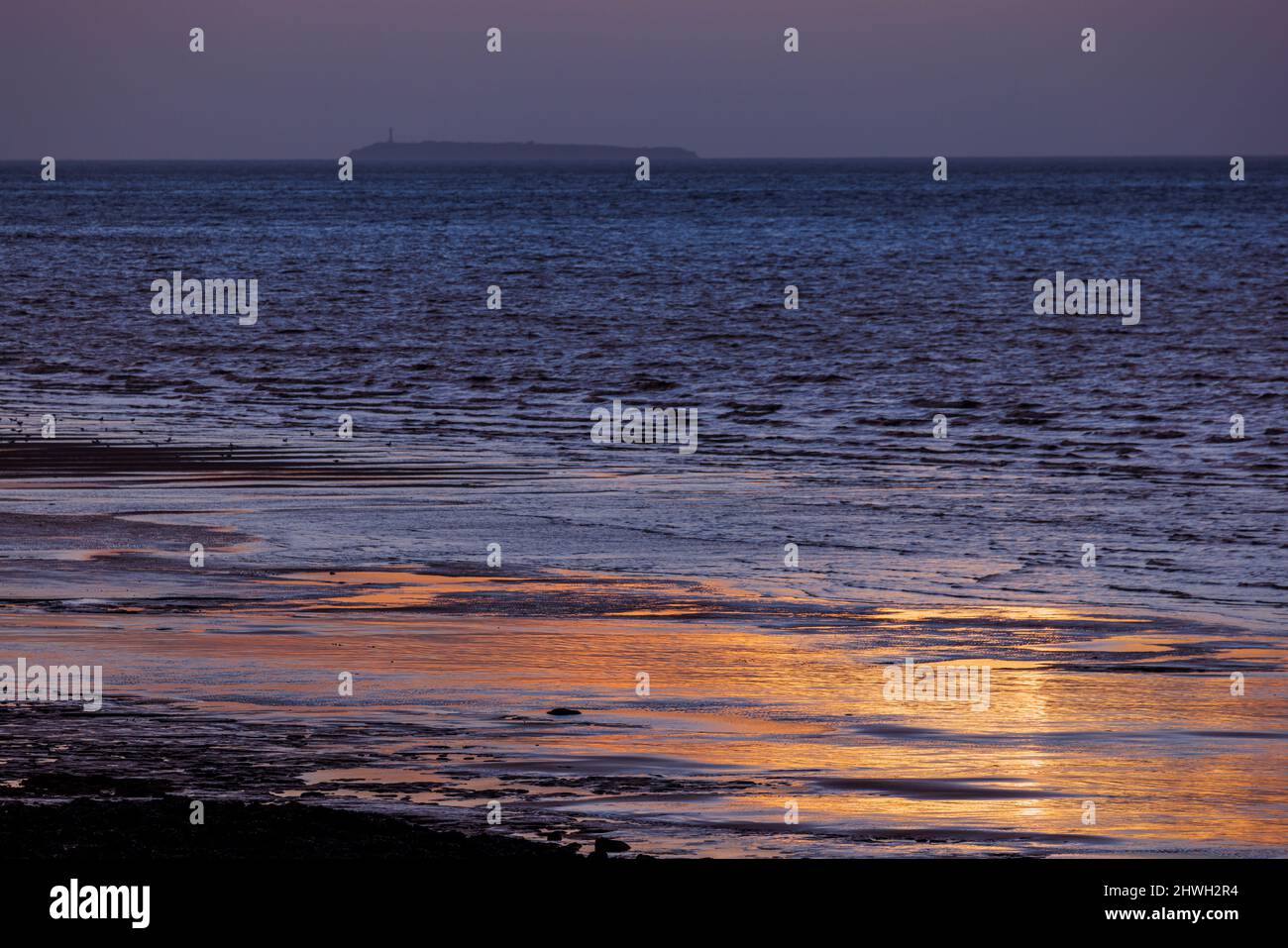 Sun rays reflecting sea blue hi-res stock photography and images - Alamy