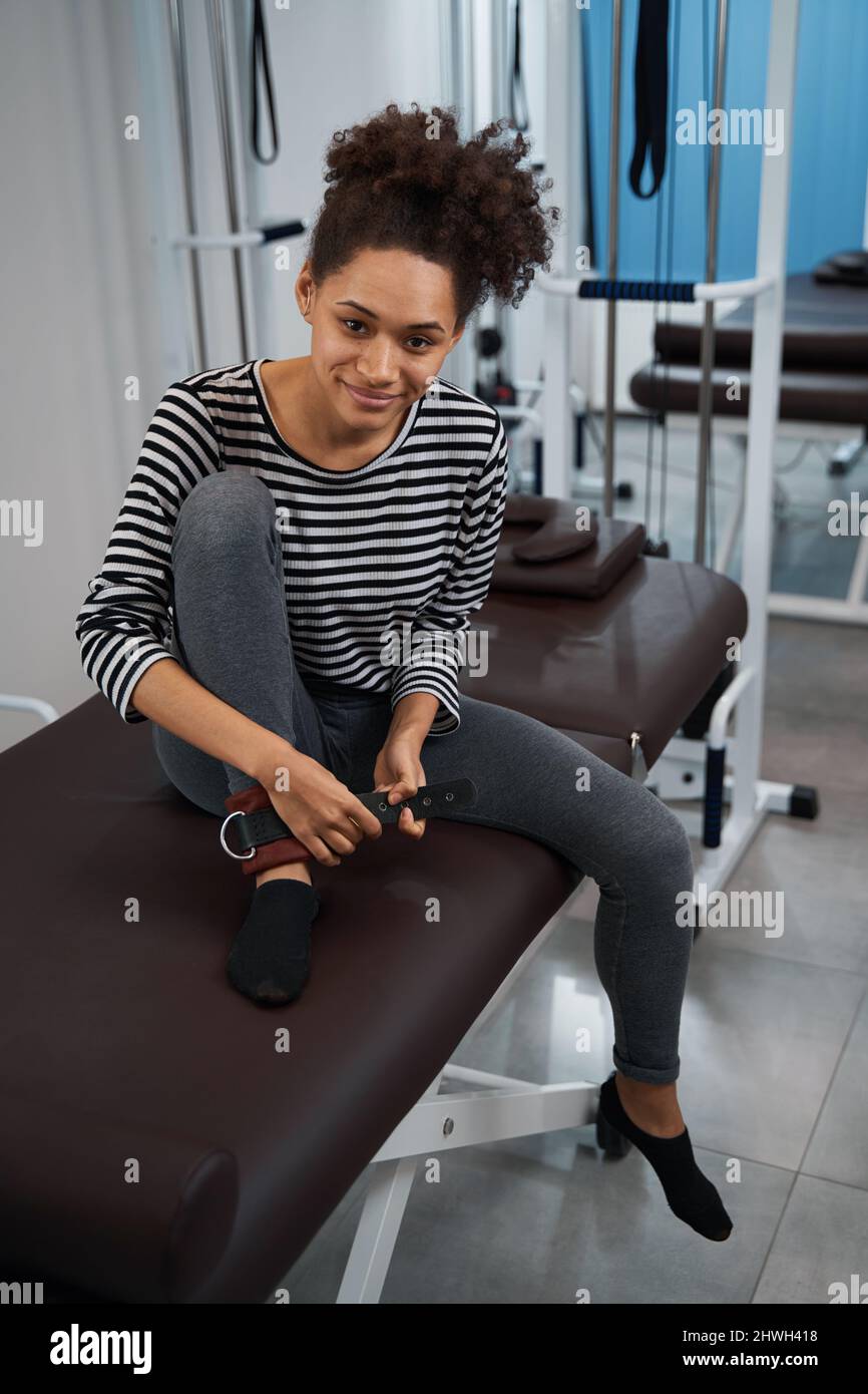 Lady getting ready for training in the gym Stock Photo - Alamy