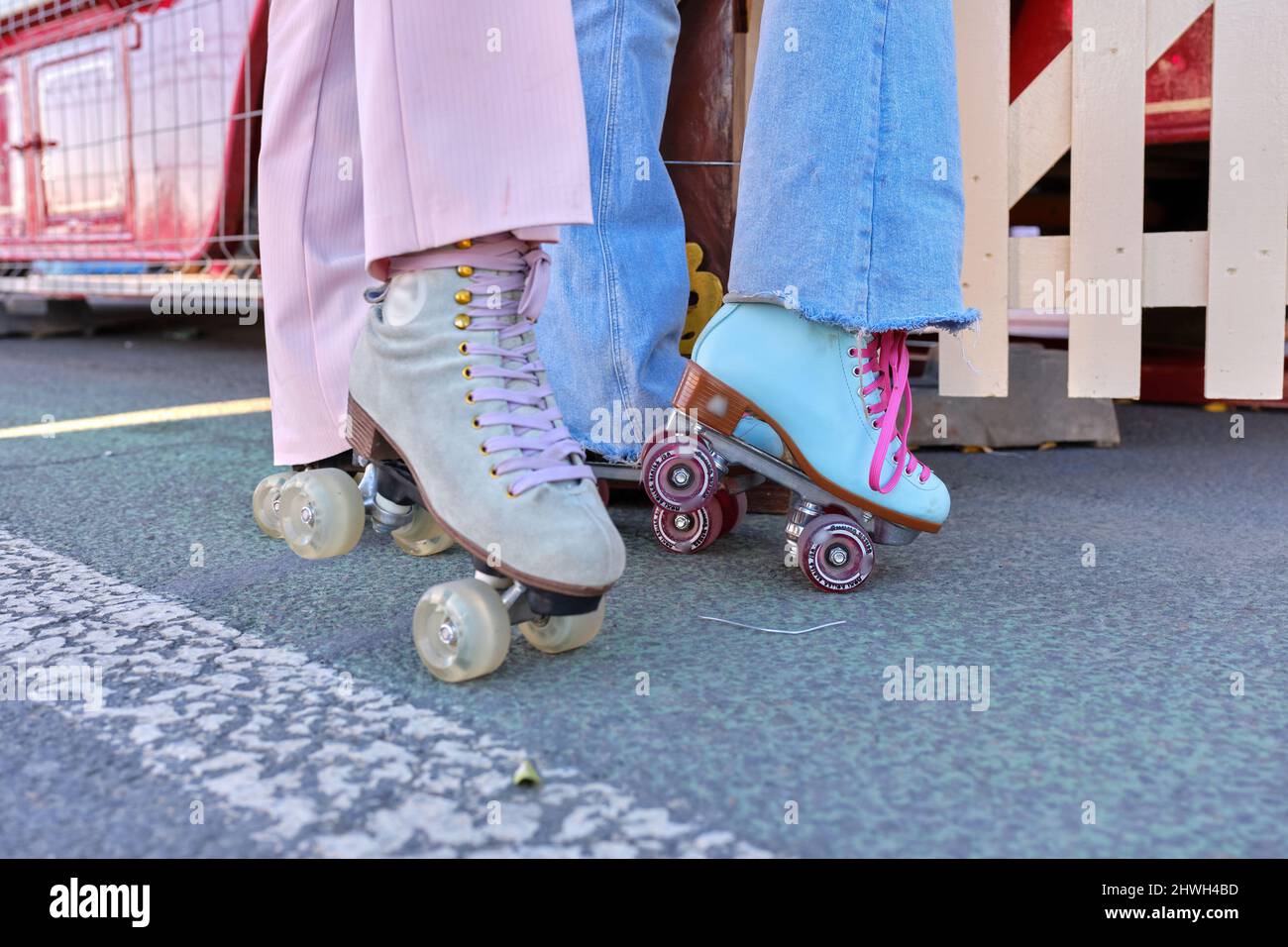 Feet of two chocas with classic skate boots outdoors Stock Photo - Alamy
