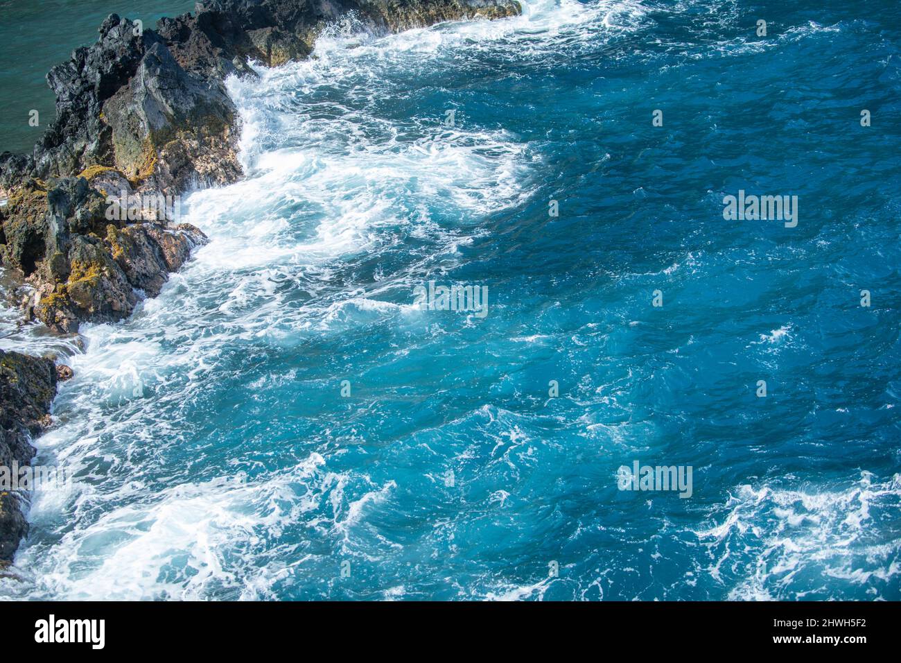 Coastal landscape with blue sea and beautiful cliffs. Stone rocks on ...