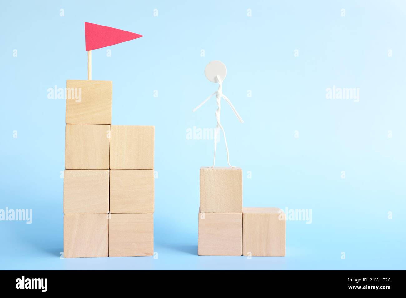 Ladder to success concept. Stick man climbing stairs with a red flag ...