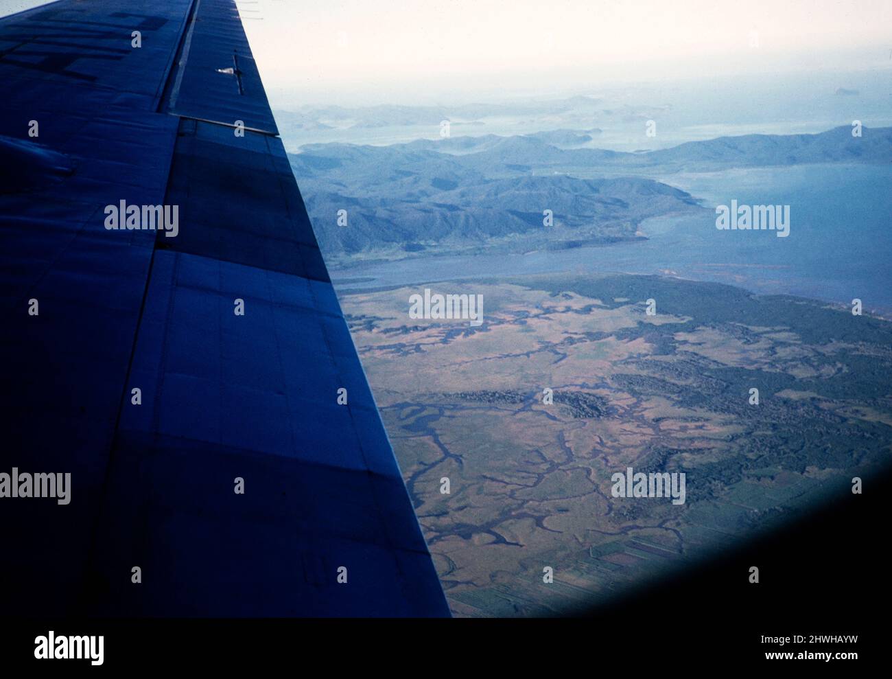 Oblique angle aerial view of Proserpine River mouth, Conway National ...