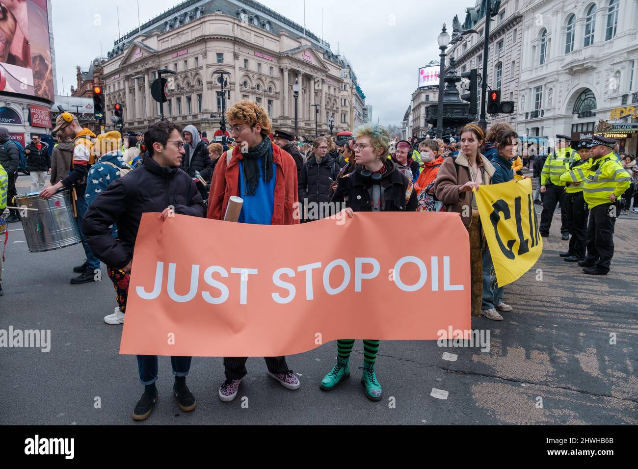 Youth Climate Swarm protest against the use of oil through London ...