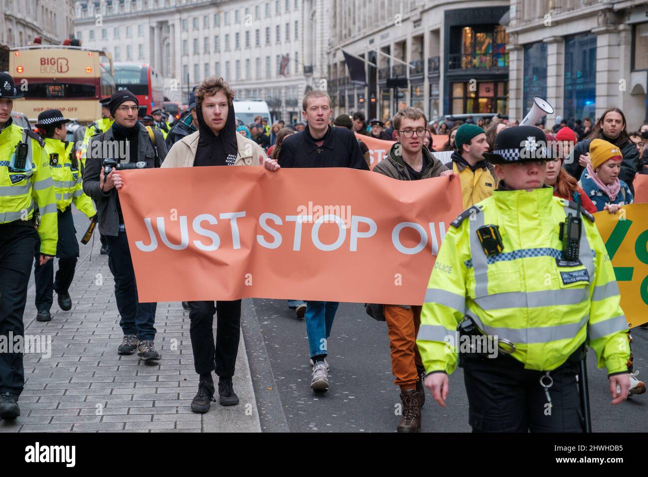Youth Climate Swarm protest against the use of oil through London ...