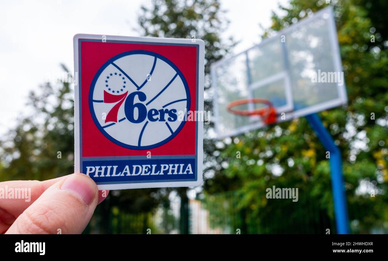 September 15, 2021, Philadelphia, USA, A man holds the emblem of the ...