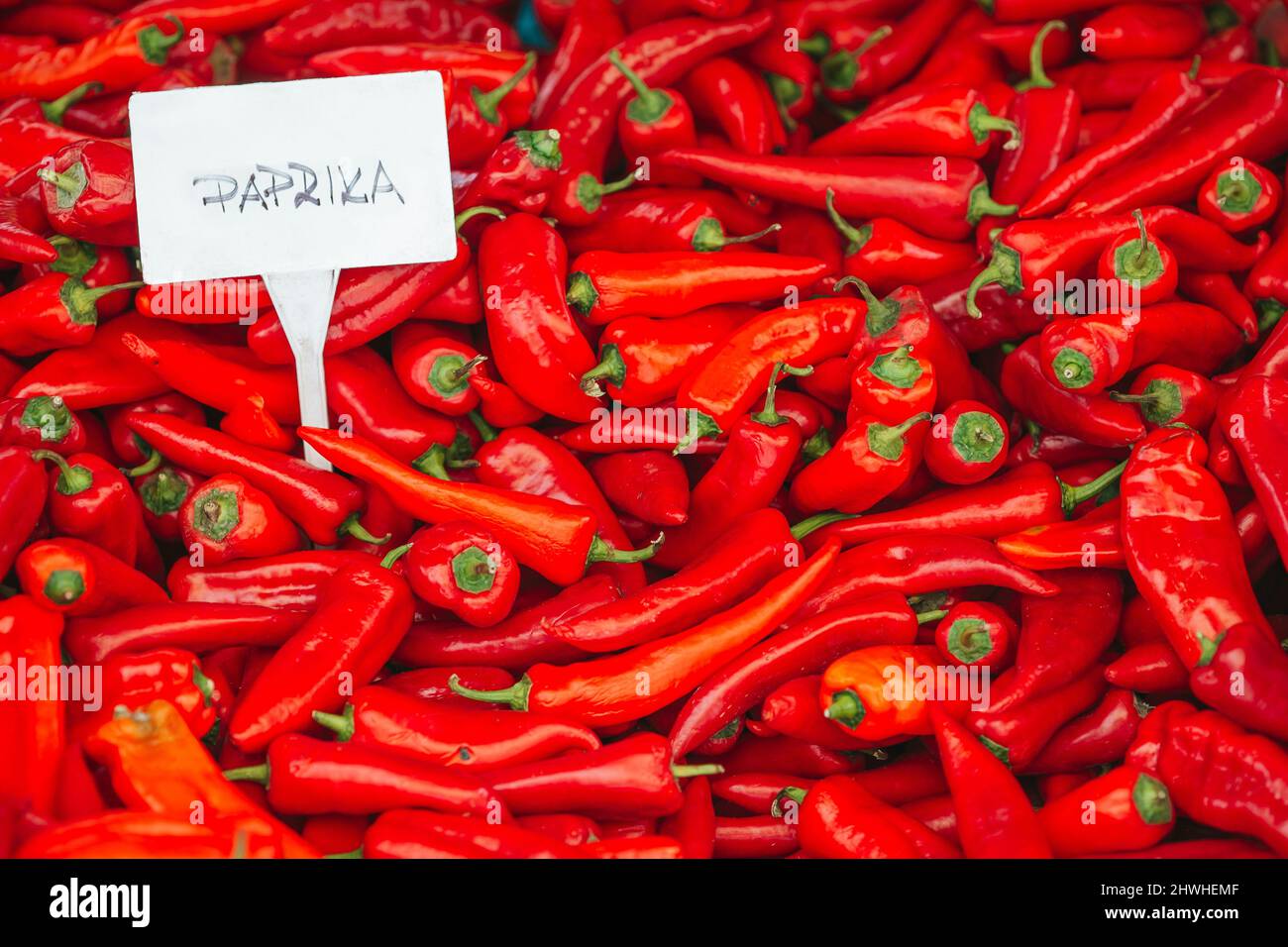 Heap of ripe big red peppers at a street market Stock Photo - Alamy