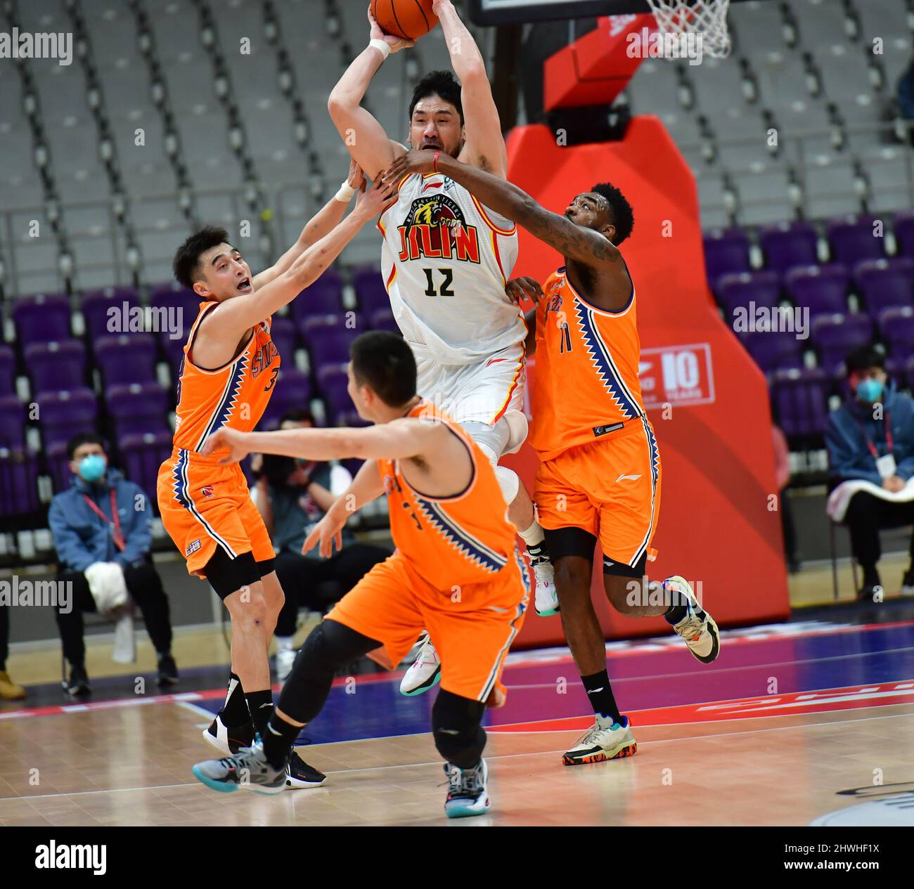 Shenyang. 6th Mar, 2022. Zhong Cheng(C) of Jilin Northeast Tigers is ...