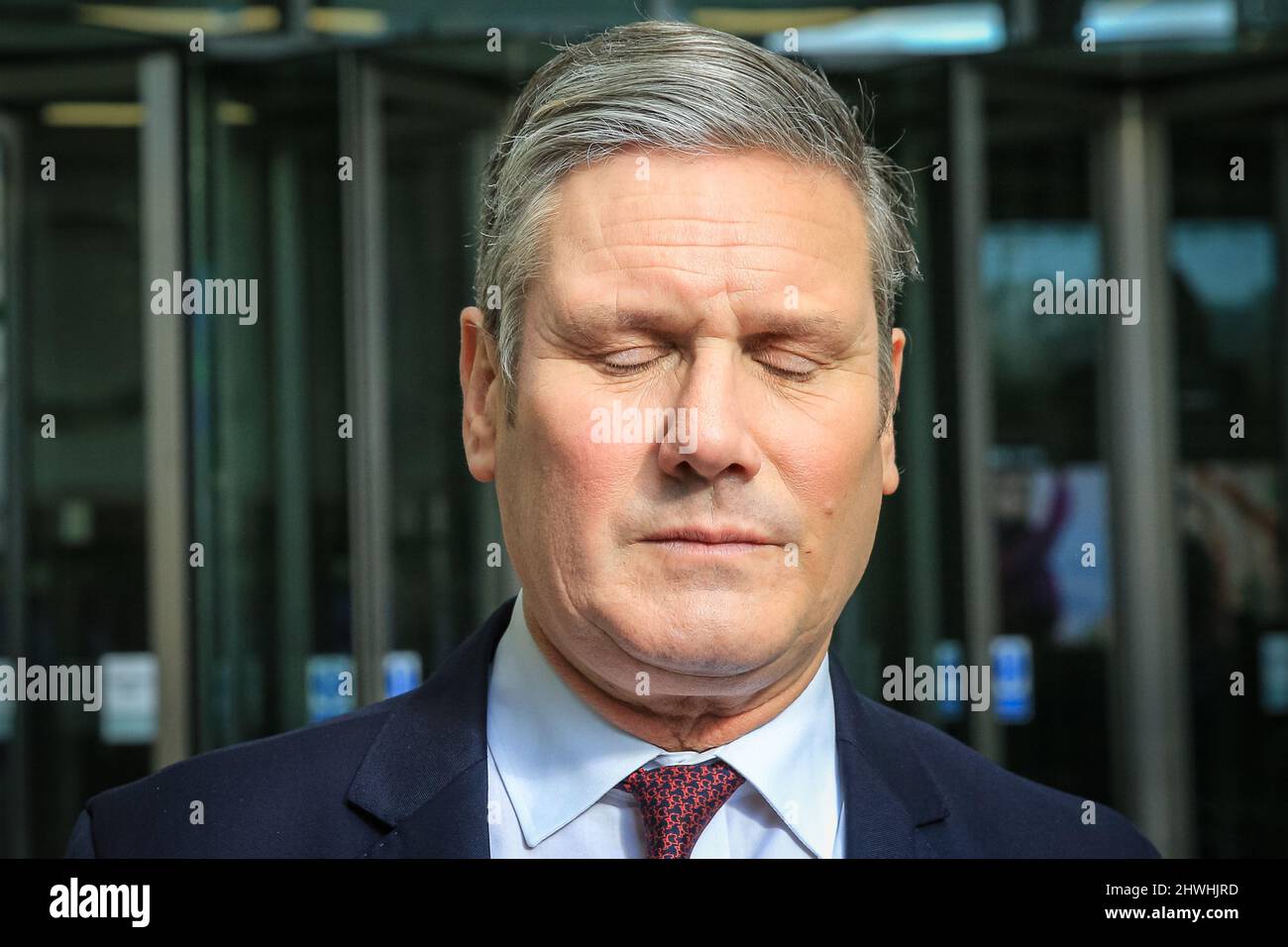 Sir Keir Starmer briefly closes his eyes during an interview. Close up ...