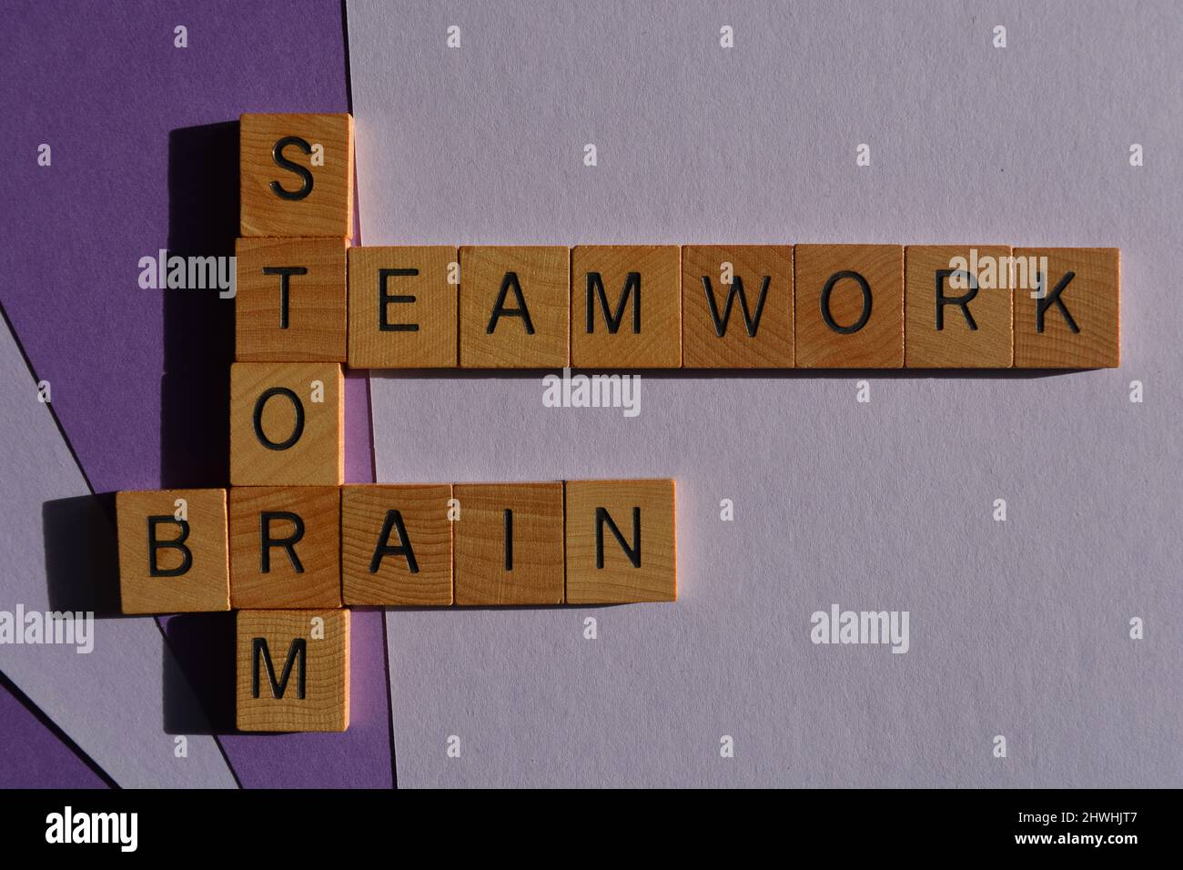 Teamwork, brain storm, words in wooden alphabet letters in crossword ...