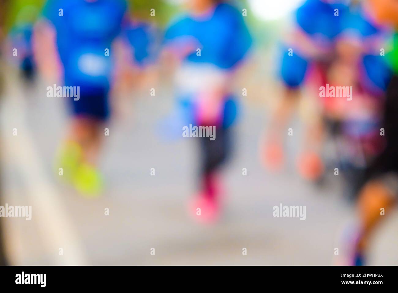 Blurred group of marathon running people in park, Athletic sport ...