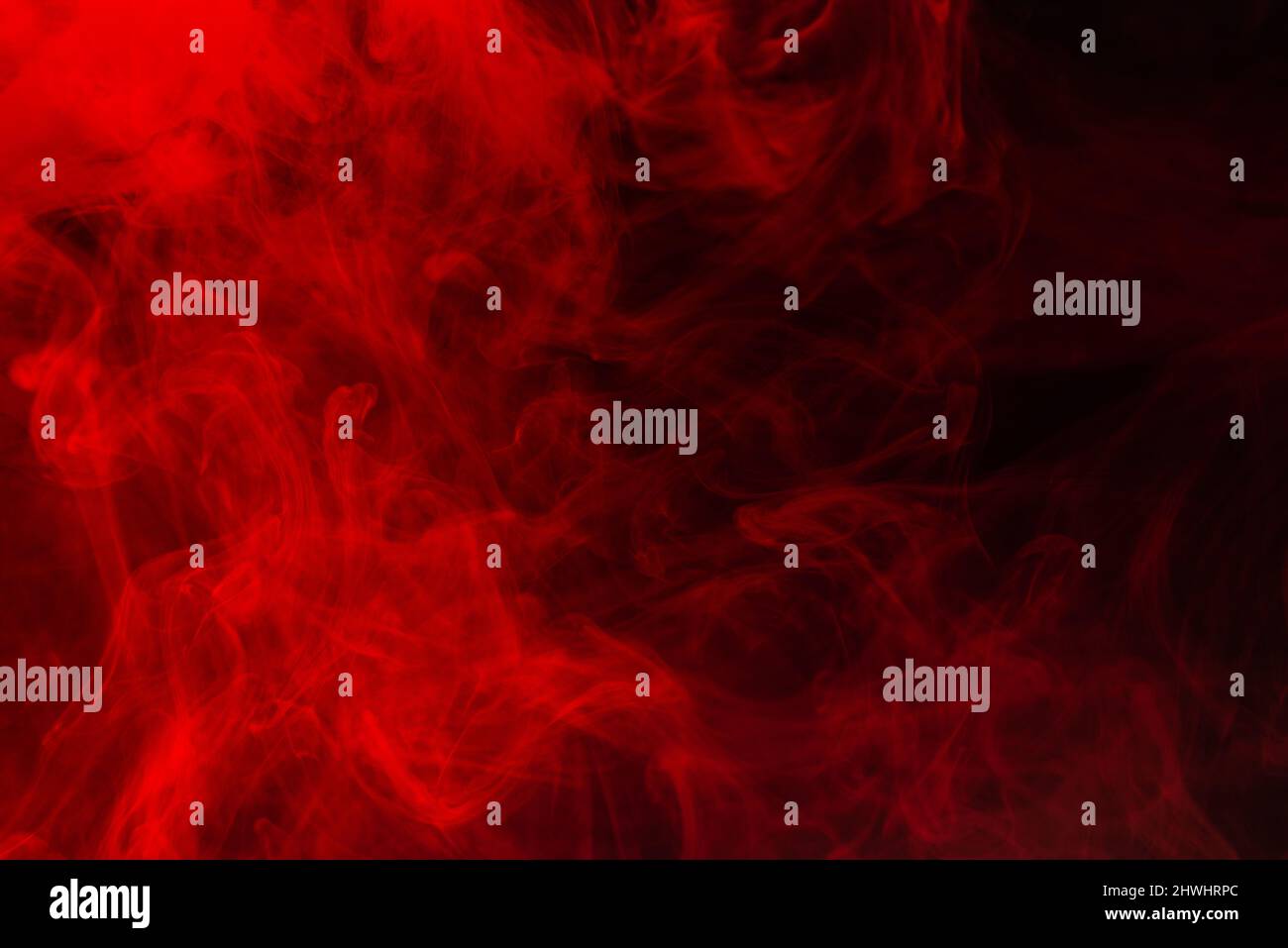 Red steam on a black background. Copy space Stock Photo - Alamy