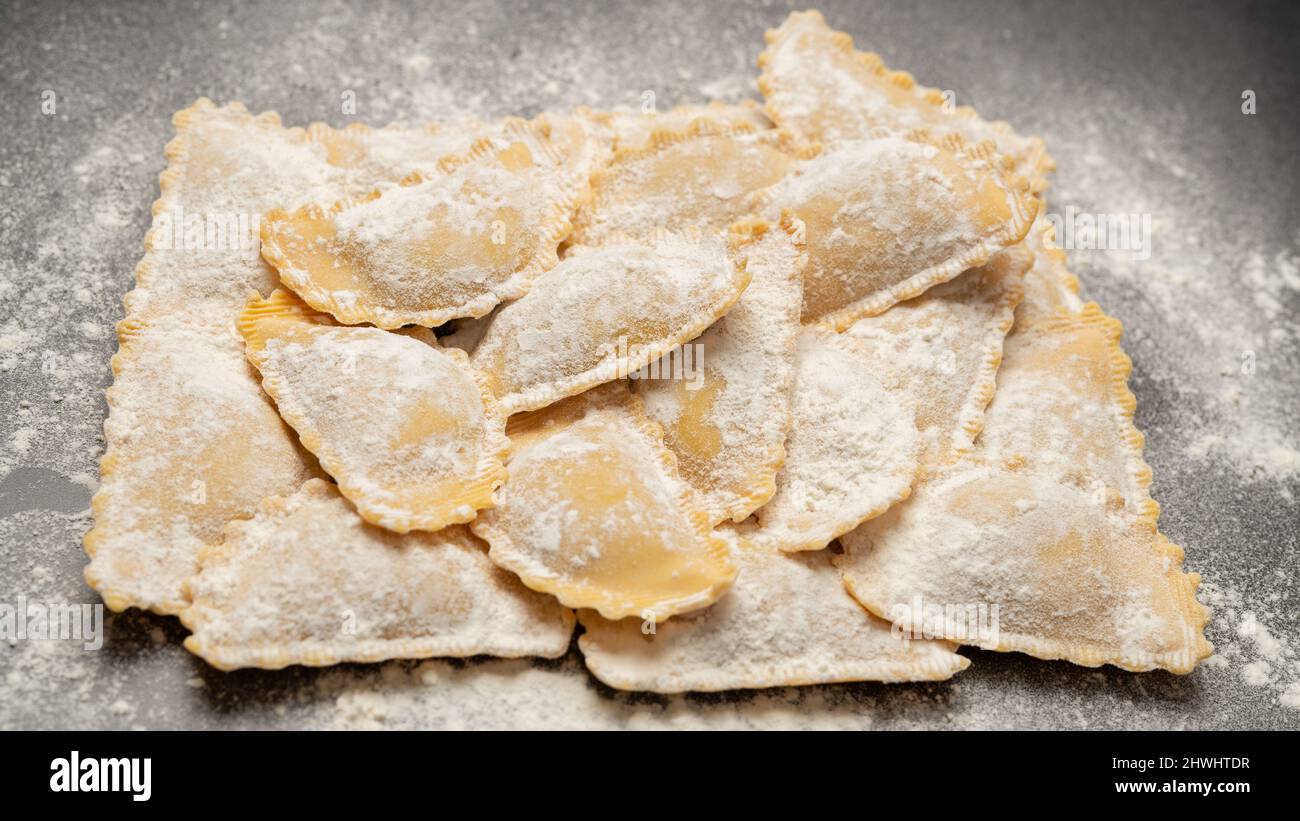 Raw ravioli as a background. Healthy italian food Stock Photo - Alamy