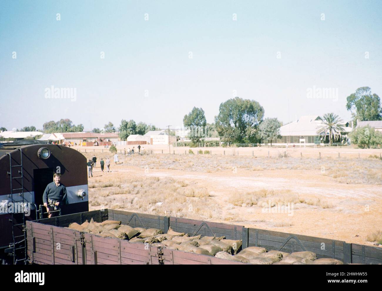 Freight wagons with sacks, Commonwealth Railways diesel engine train ...