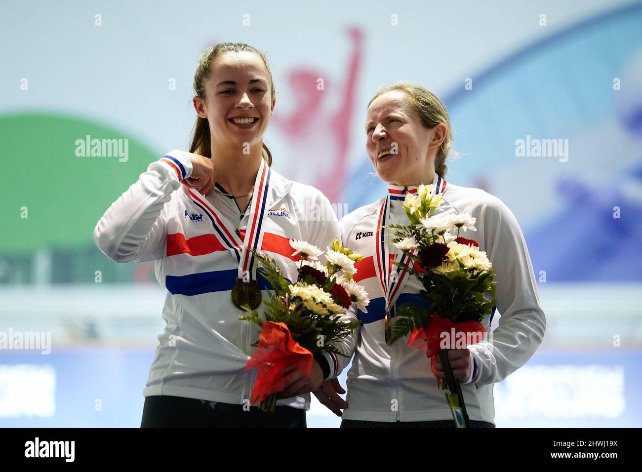 Lora Fachie MBE (right) and pilot Georgia Holt celebrate on the podium ...
