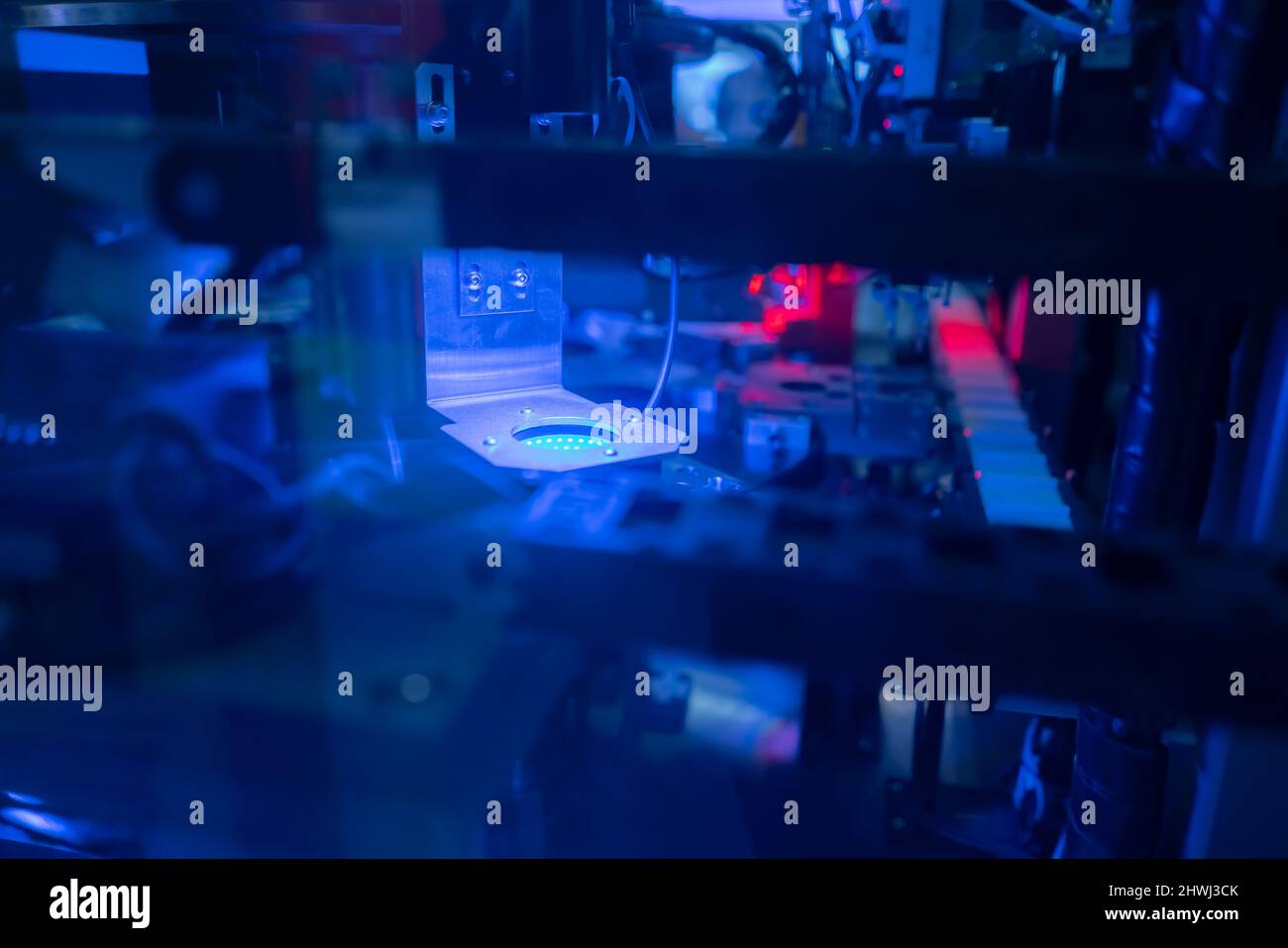 High technology blue light automated machine Stock Photo - Alamy