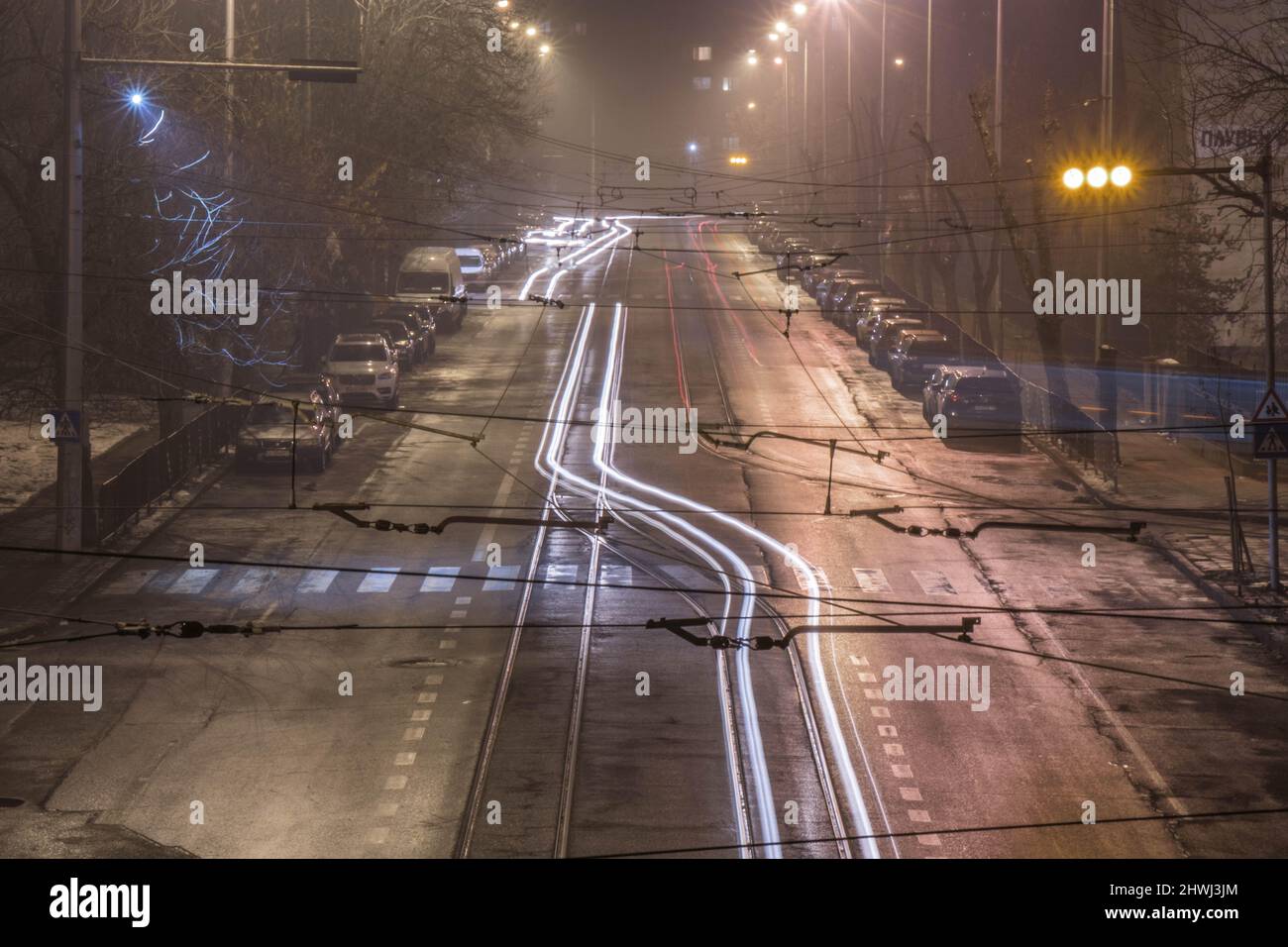 City streets at night with some light trails Stock Photo - Alamy