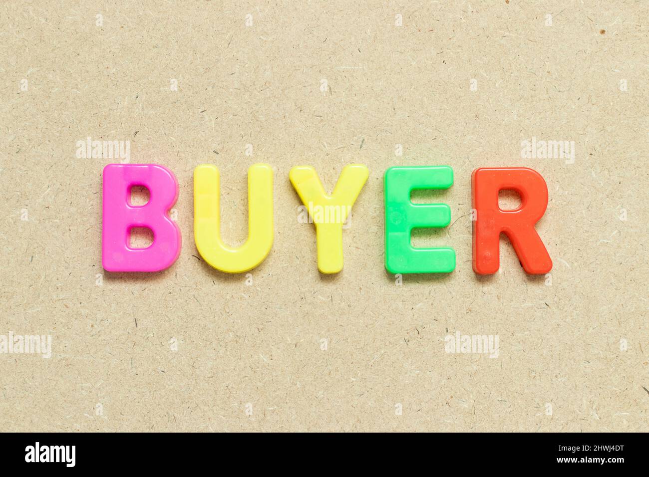 Color alphabet letter with word buyer on wood background Stock Photo ...