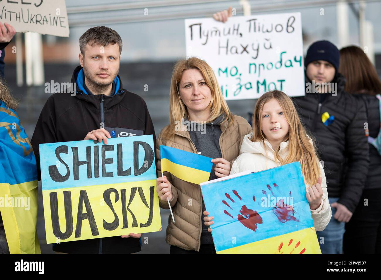 Cardiff, Wales, UK. 6th Mar, 2022. Protesters hold messages during an ...