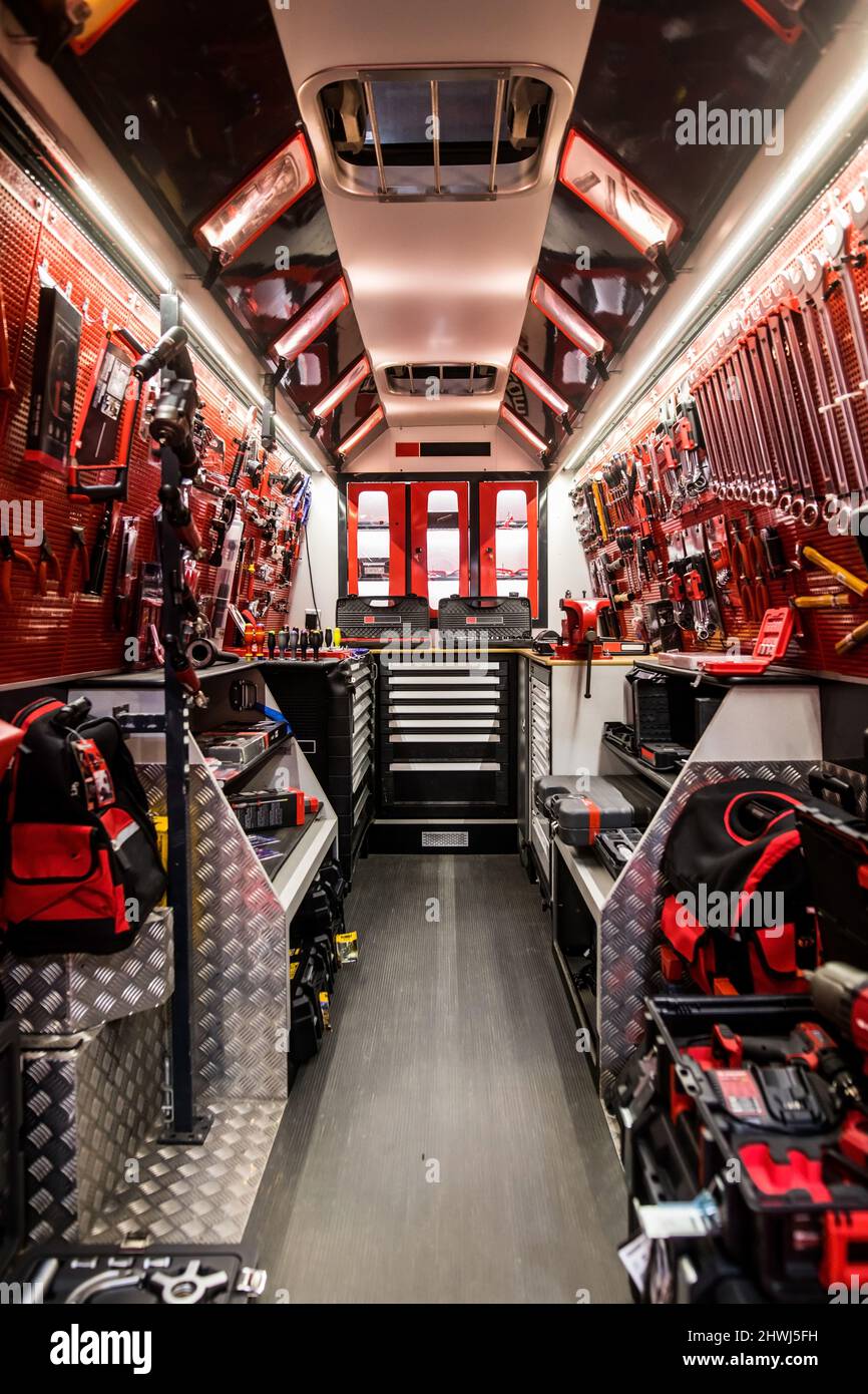 Image of a mobile auto service truck with various tools and devices ...