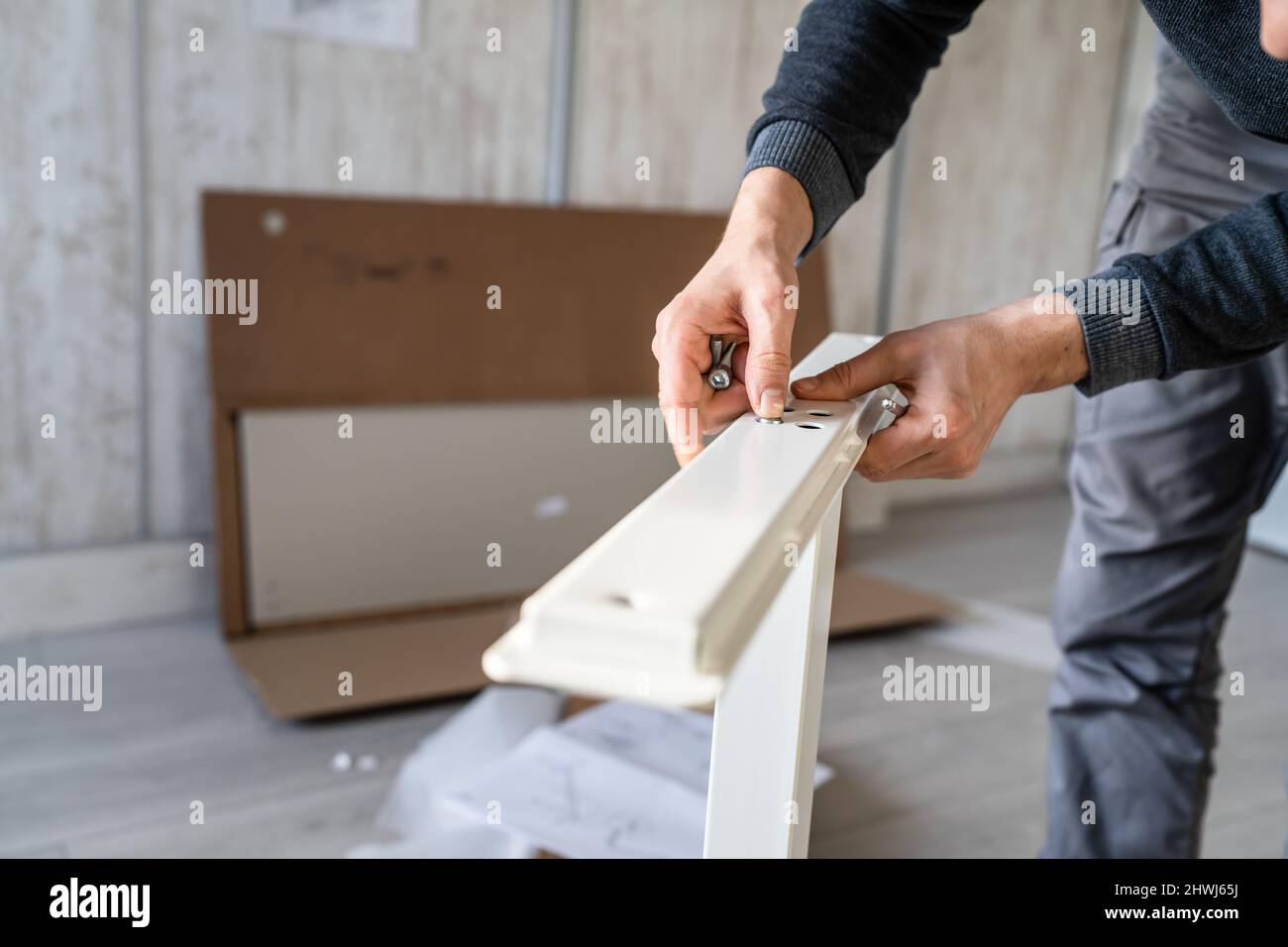 One man unknown caucasian male sitting on the floor at home Putting ...