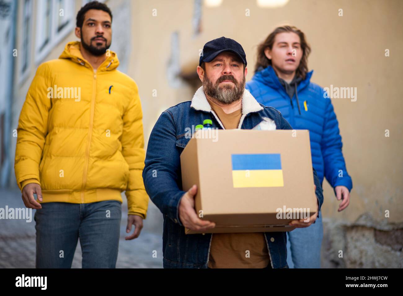 Team of volunteers collecting boxes with Humanitarian aid for Ukrainian ...