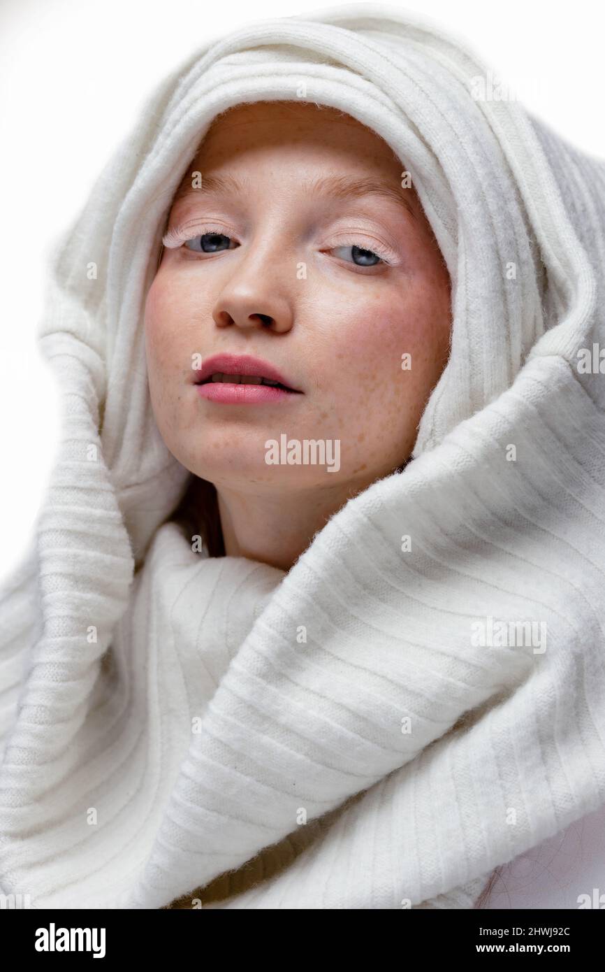 Fashion portrait of redhead young woman with white extended eyelashes ...