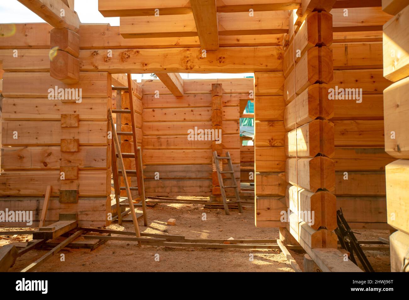 New house wooden log construction interior with exposed framing with ...