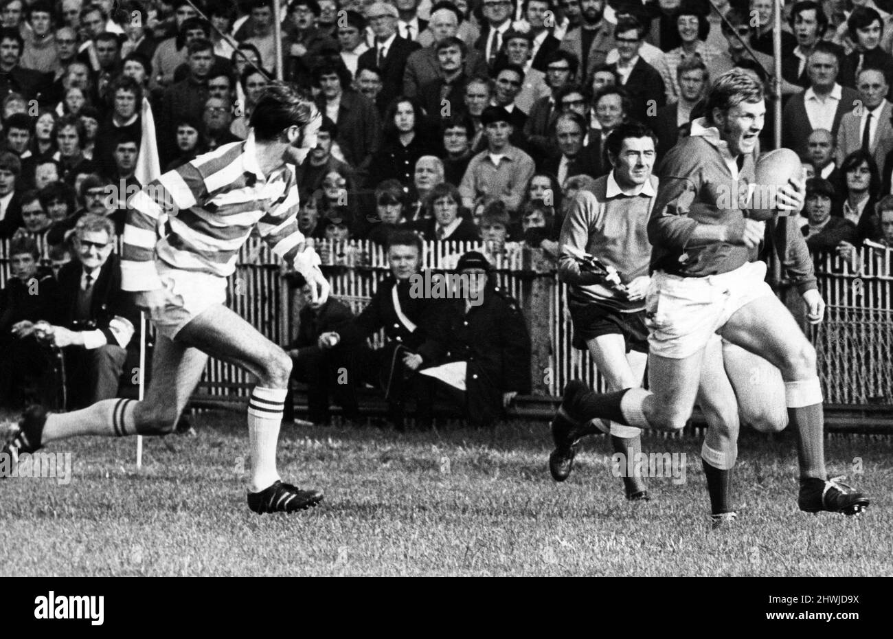 Roy Mathias, Llanelli Rugby Union Player, races for the Canadian line ...