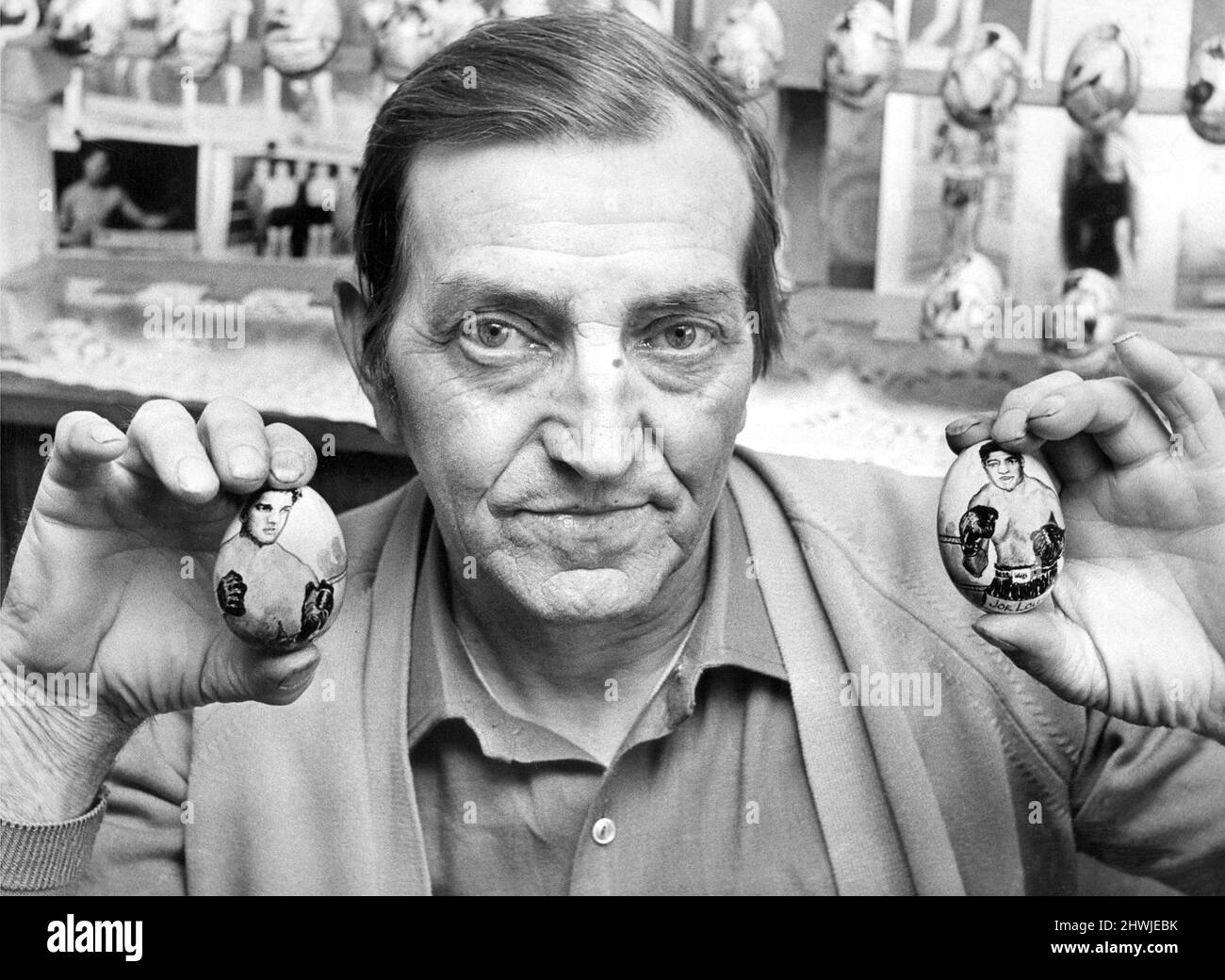 "Egg man" Jack Craig holds up two of his portraits of former ...