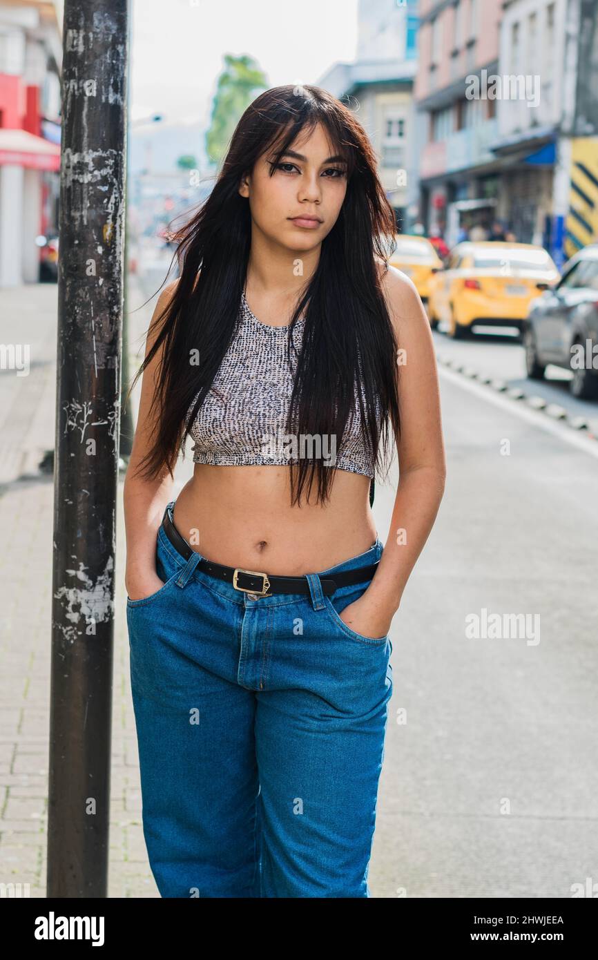 Beautiful Latina Girl With Brown Skin Posing Very Serious For The Camera And Focused On The 7541