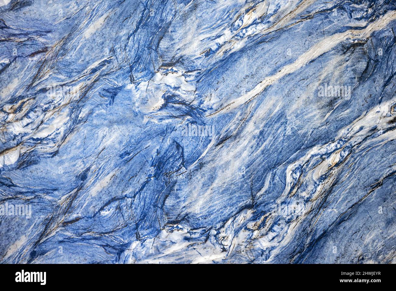Texture of natural blue quartz stone with black-white blotches Stock ...