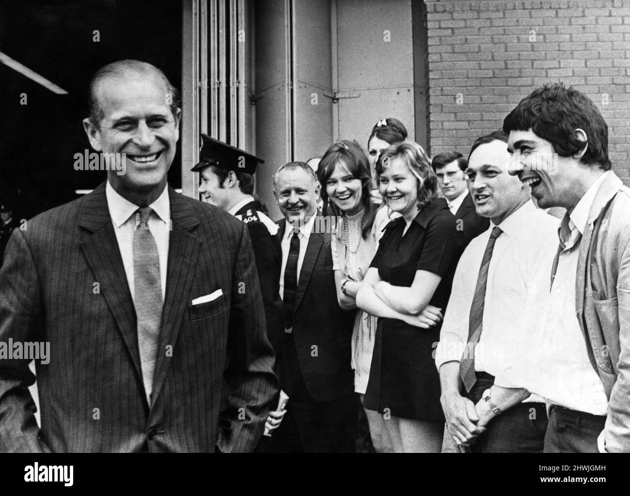 Prince Philip visiting Wales. A smiling Duke of Edinburgh turns after ...