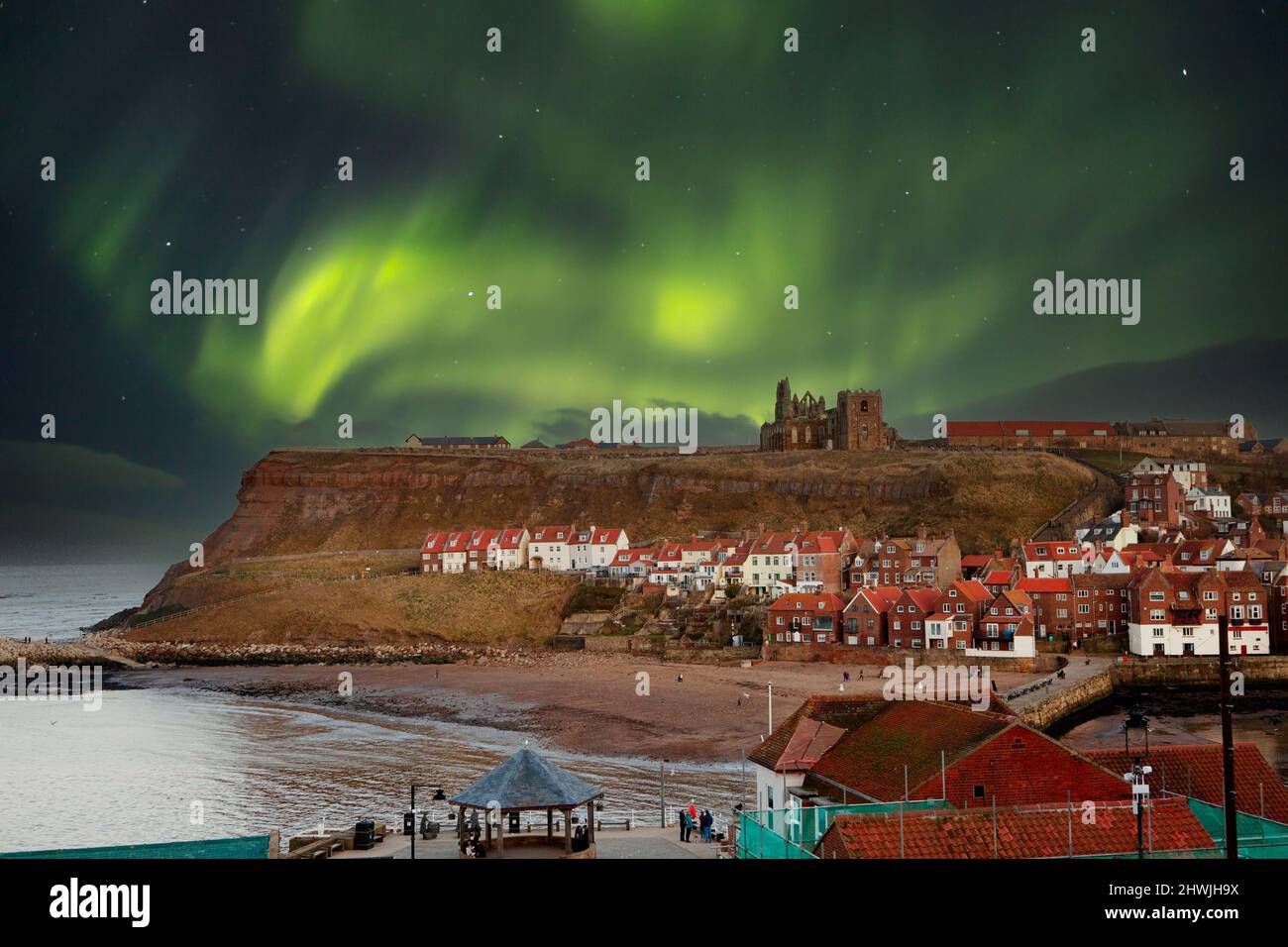 Whitby East cliff and abbey during the Aurora Borealis Stock Photo - Alamy