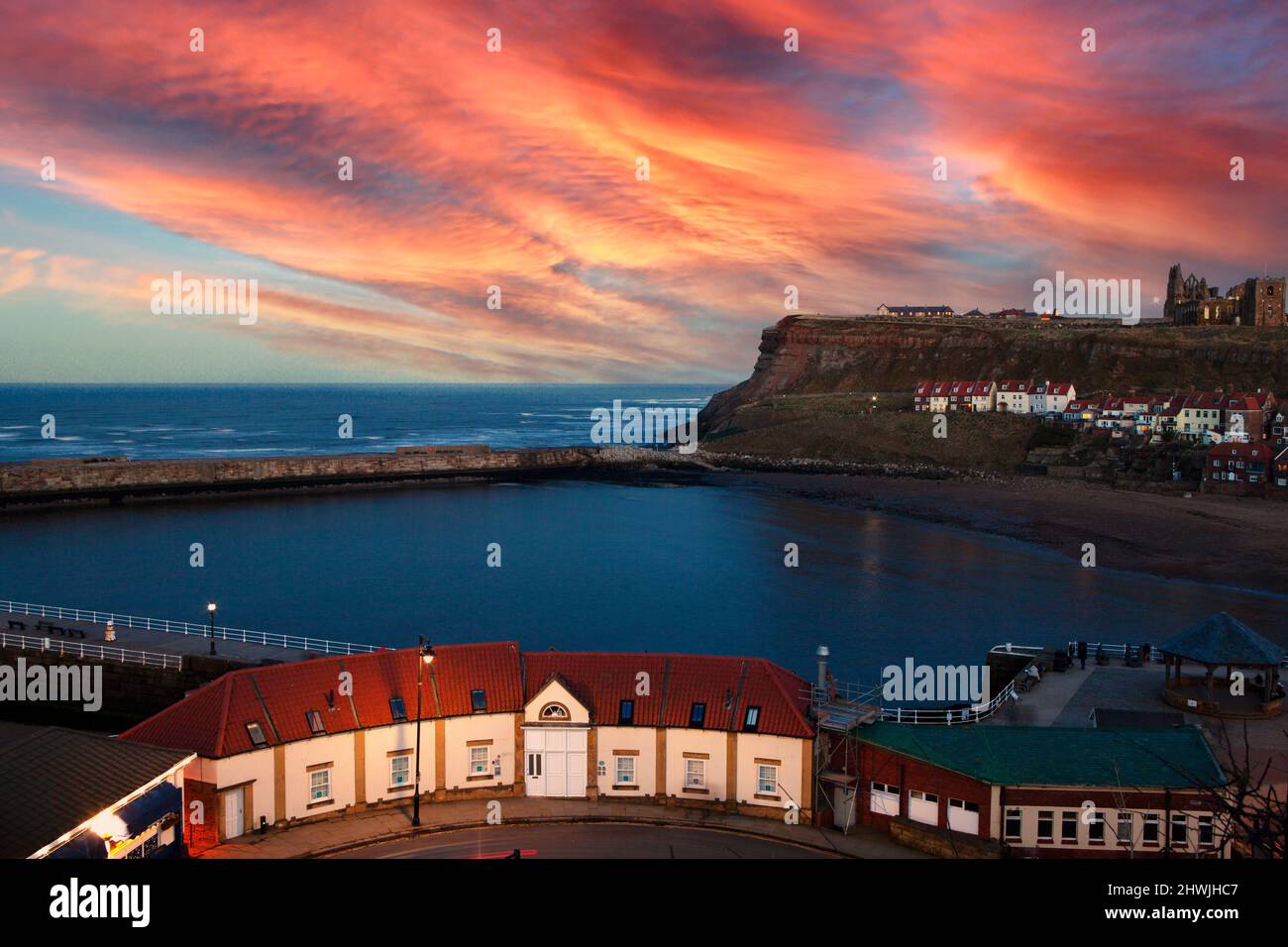 Dramatic view of St. Mary's Church, Whitby Abbey and the river from ...