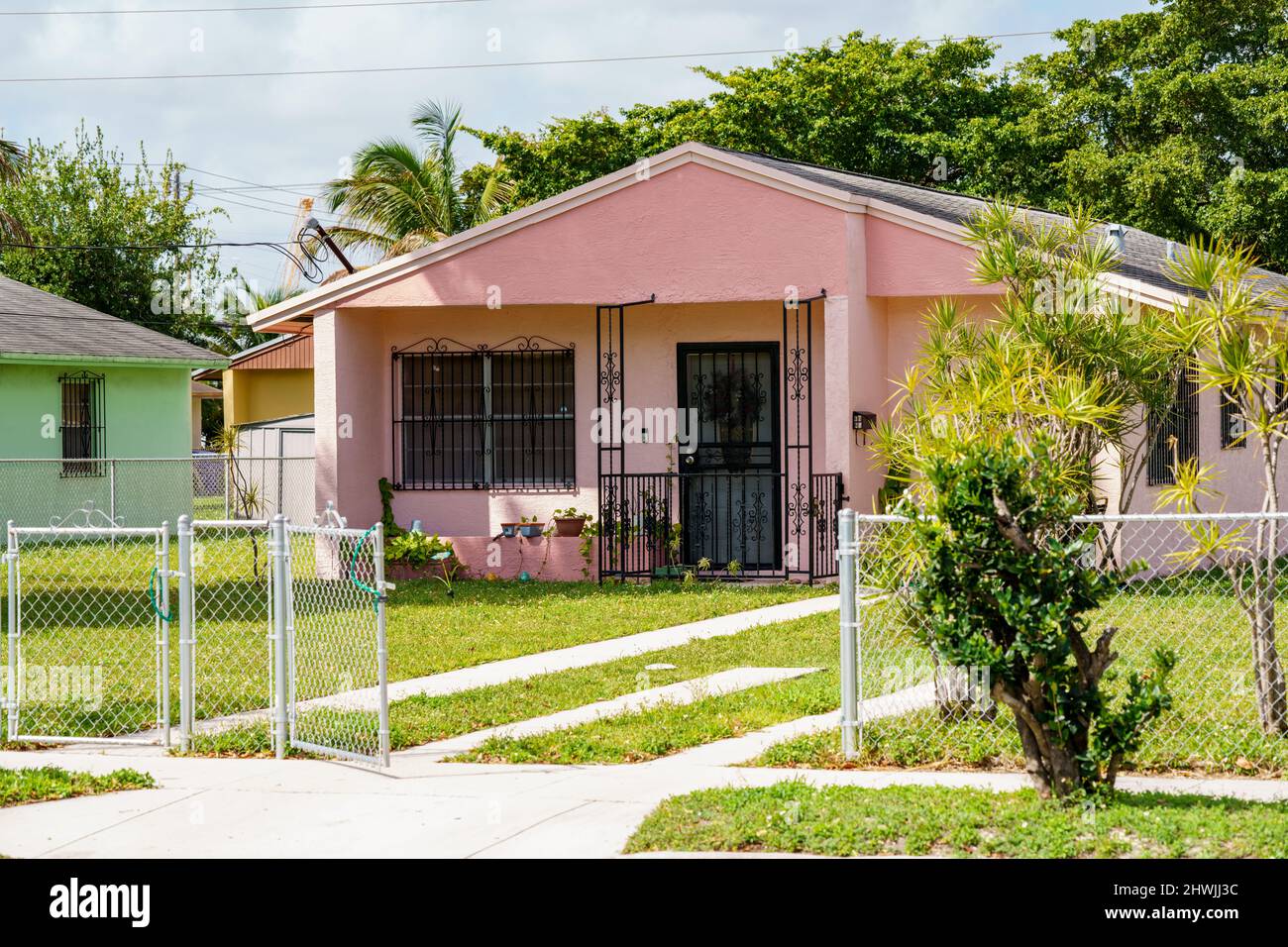 Miami, FL, USA - March 5, 2022: Photo of a pink house with fence in ...