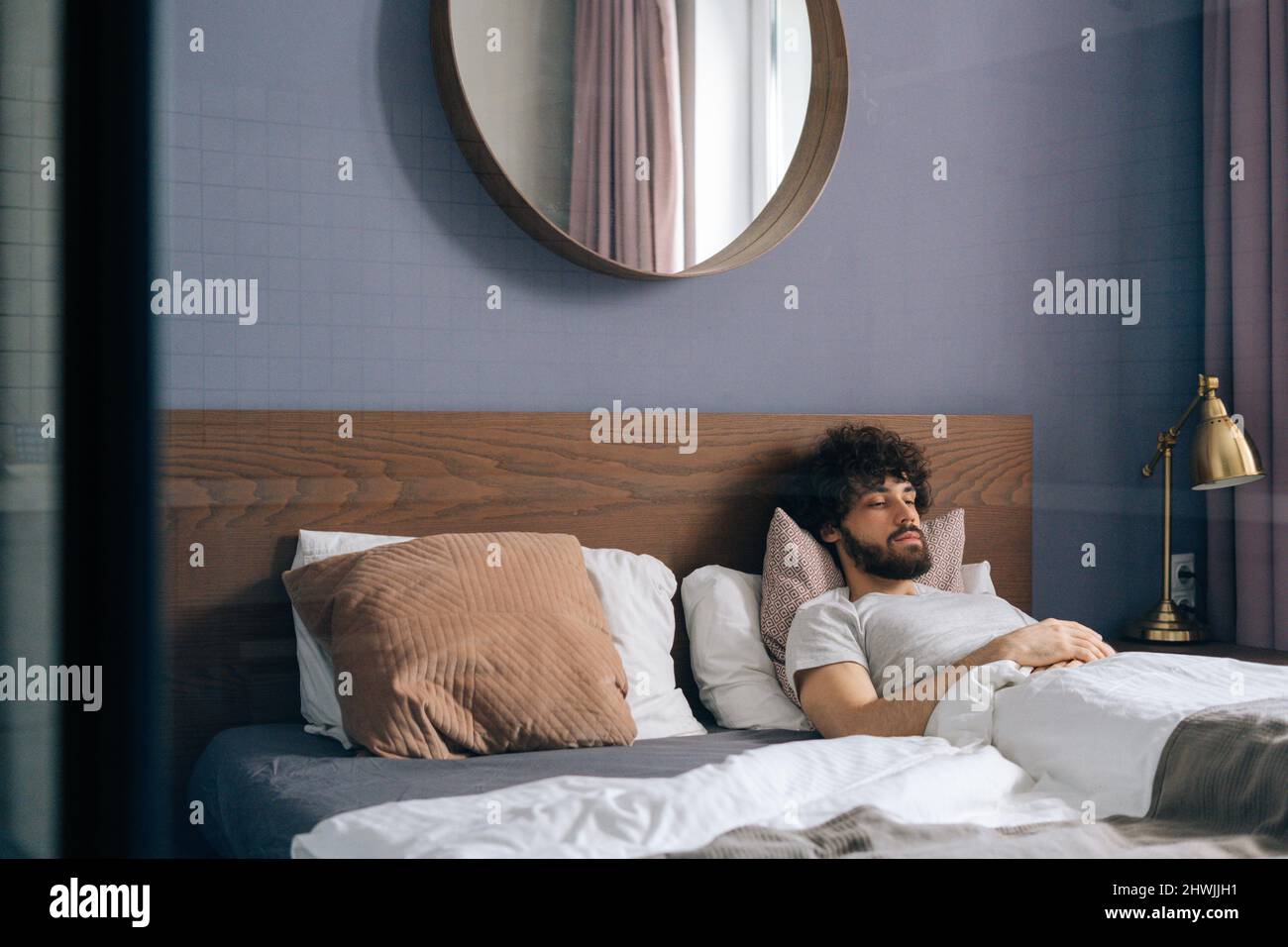 Person Sleeping In Bed On Back