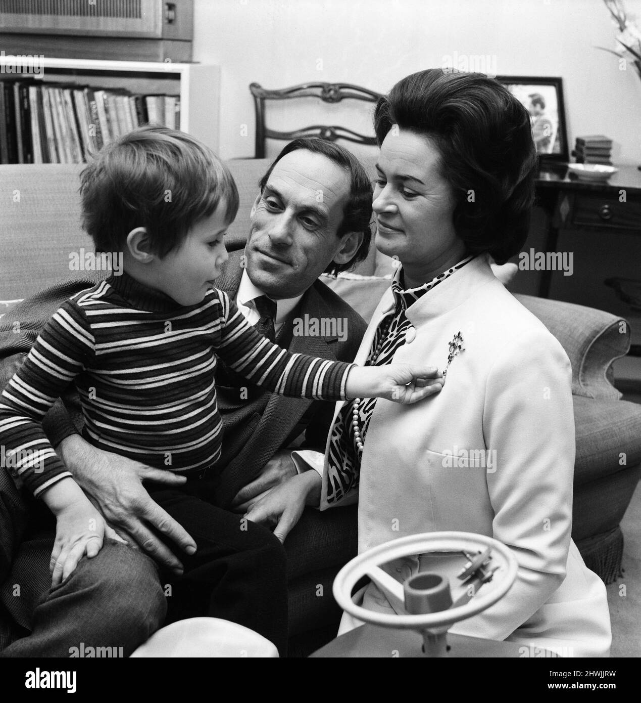 Rupert Thorpe, who will be four in April, pictured with his new mother ...