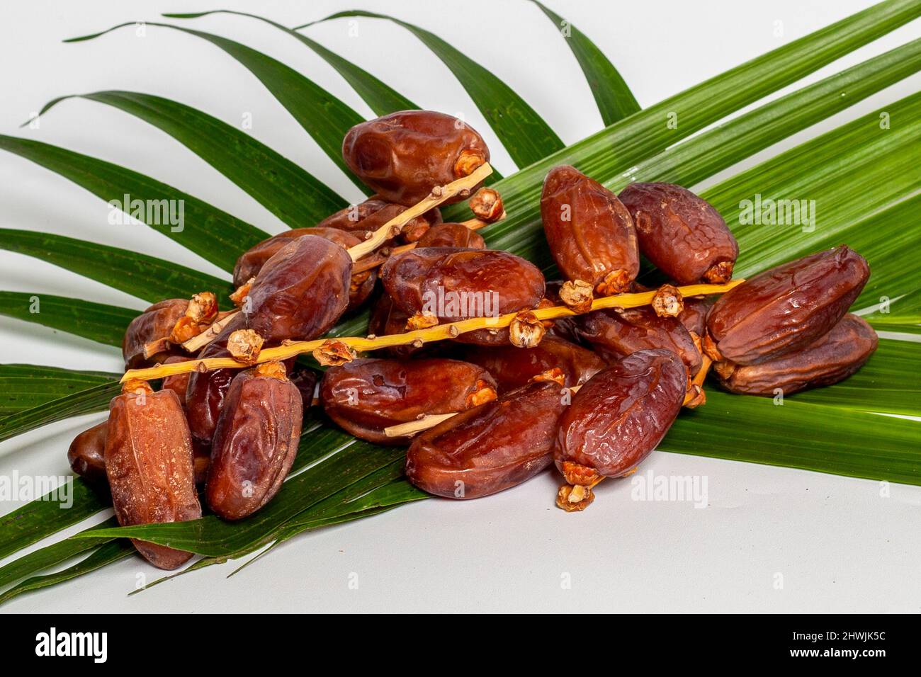 Dried dates (fruit of Phoenix dactylifera dates). Clipping paths for ...