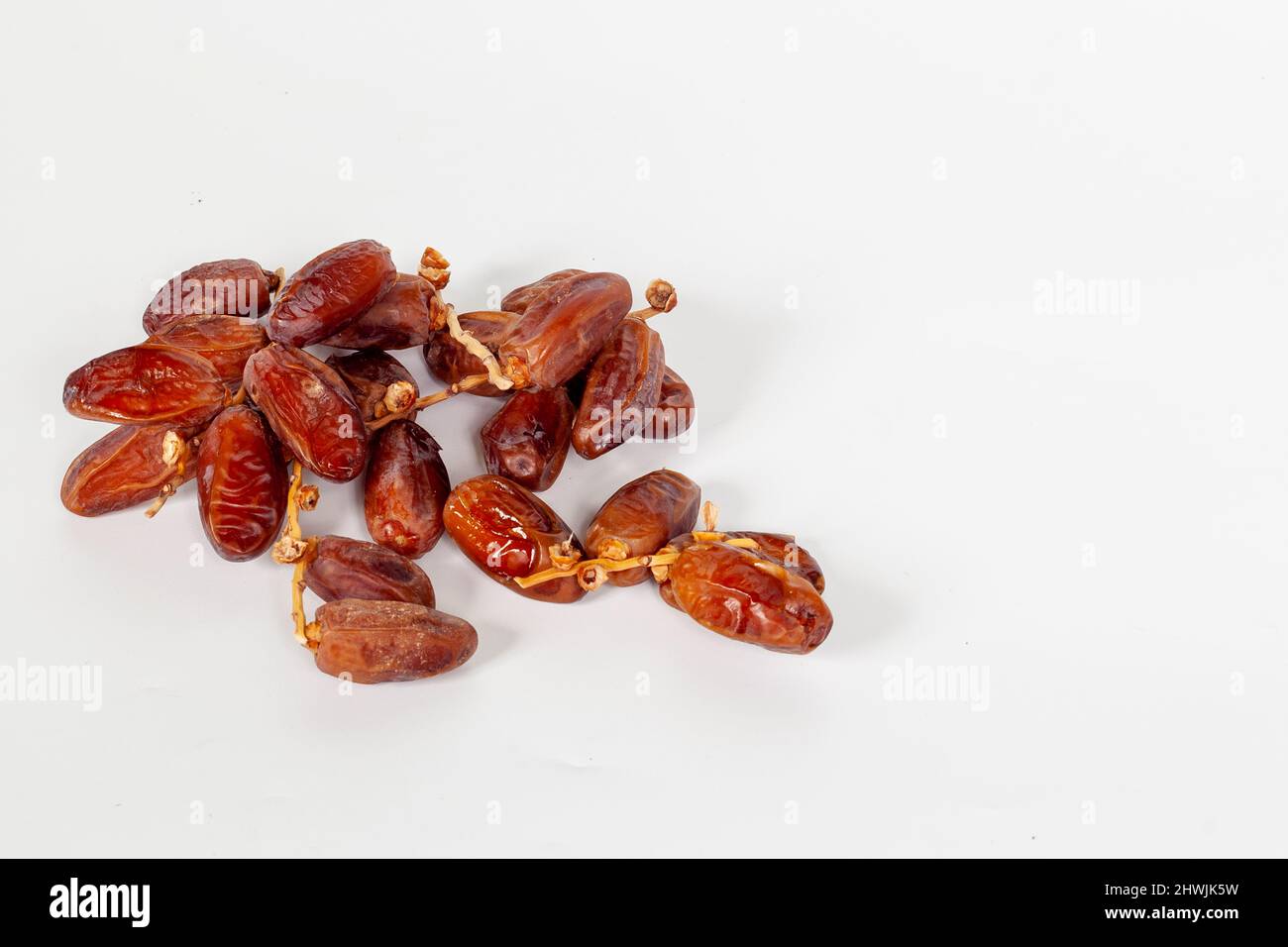 Dried dates (fruit of Phoenix dactylifera dates). Clipping paths for ...