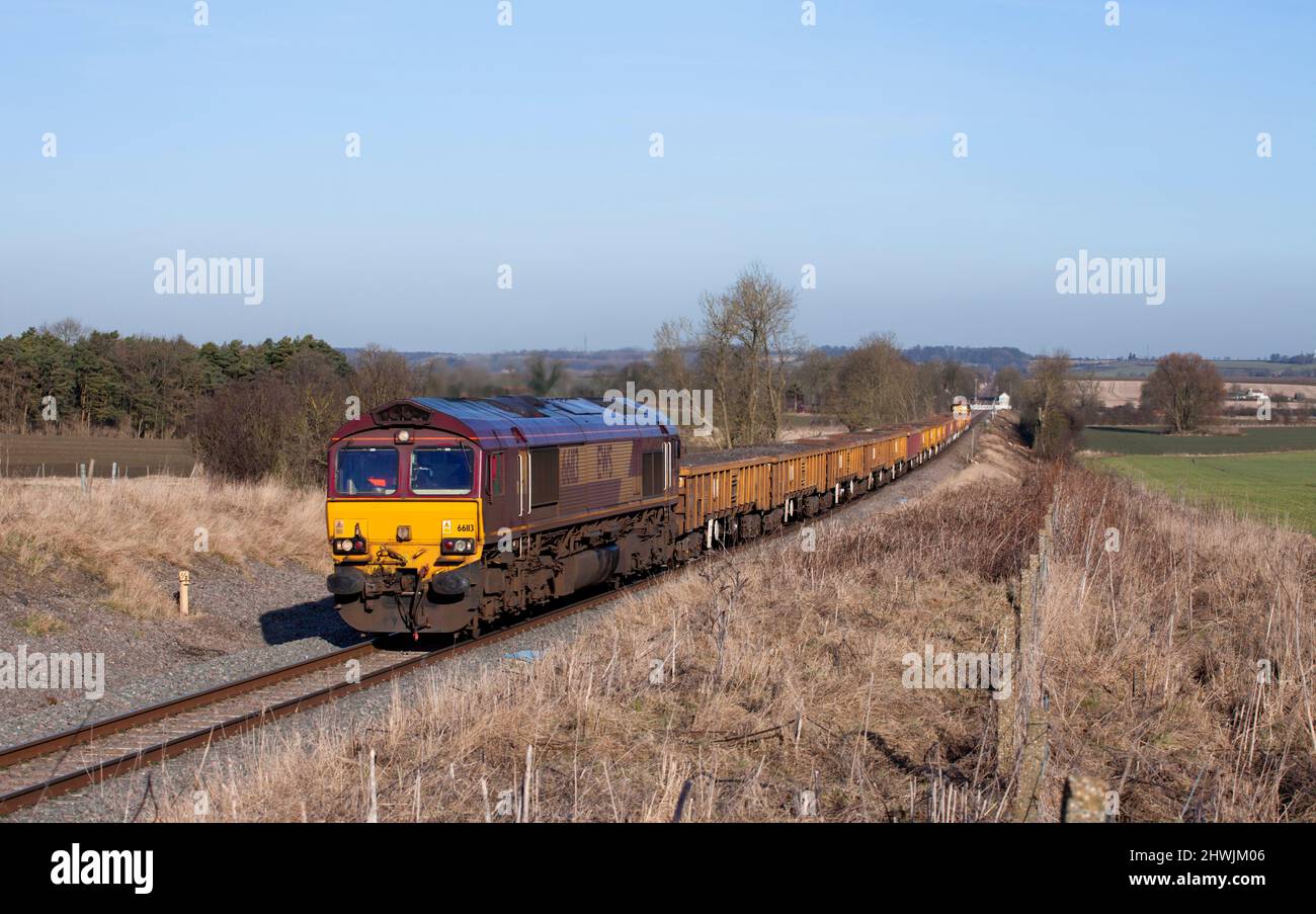DB Cargo rail class 66 diesel locomotive 66113 passing Southorpe on the ...