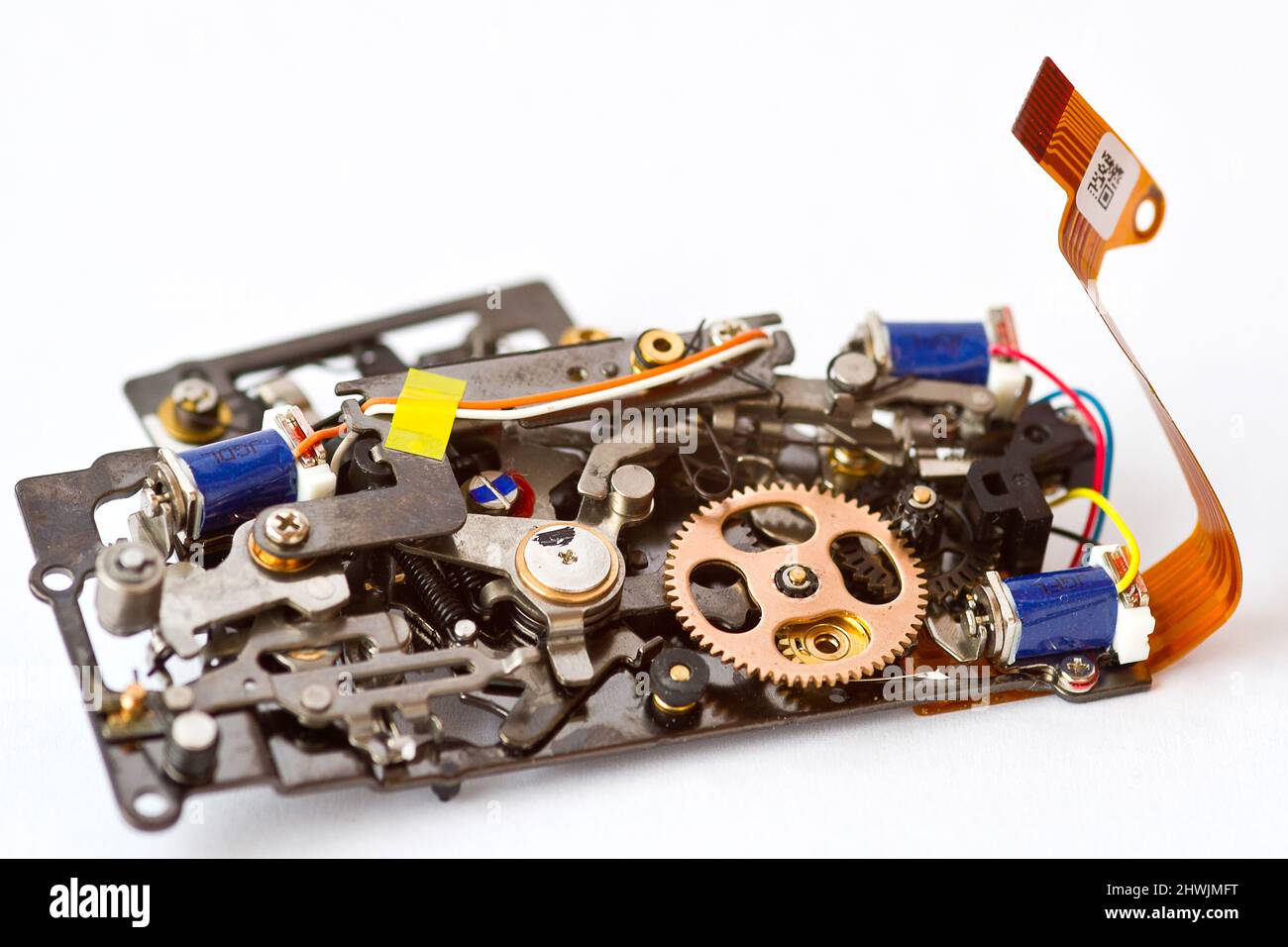 Mechanisms and gears inside a professional camera after being taken ...