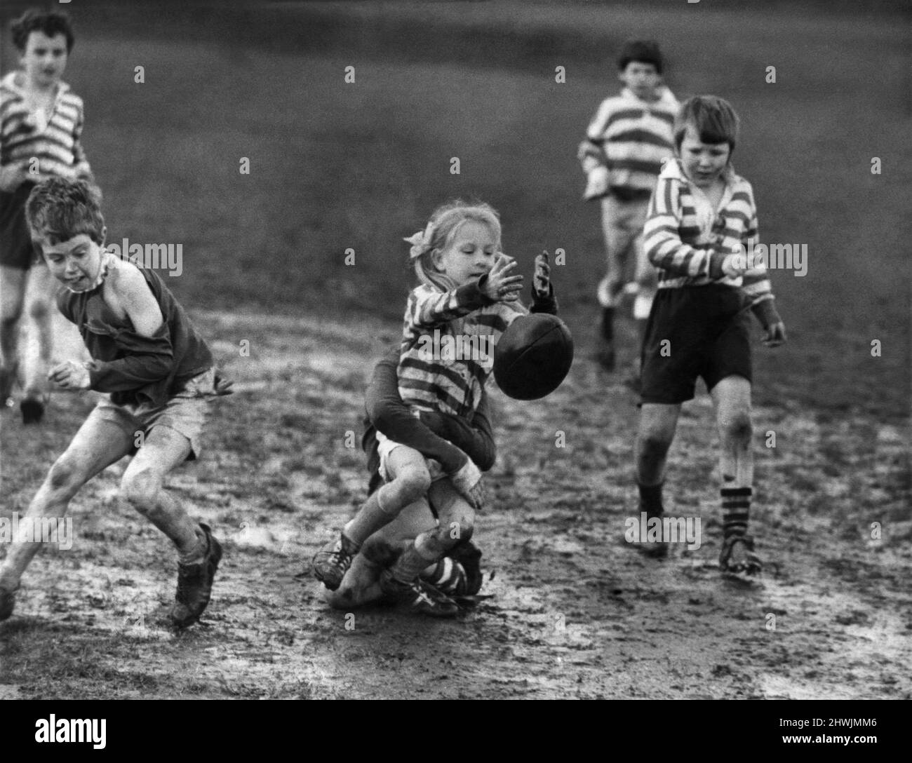 Children playing rugby in the mud 5th April 1972. When it comes to ...