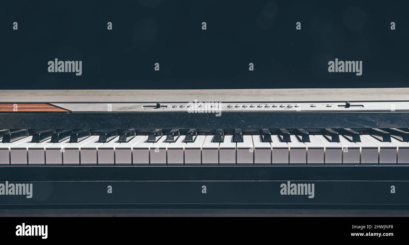 Piano keys isolated in the dark, copy space Stock Photo - Alamy