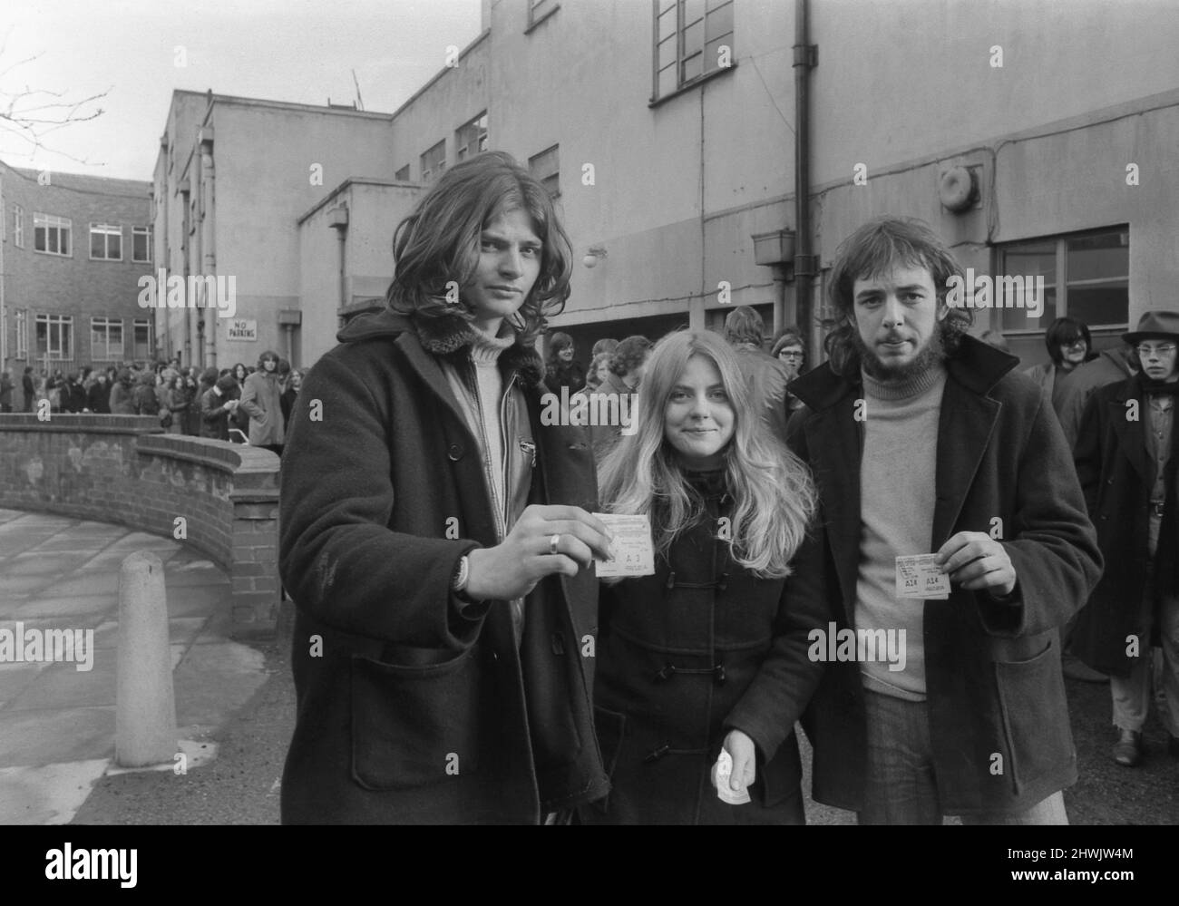 Fans queue to buy concert tickets at Coventry Theatre where The Rolling ...