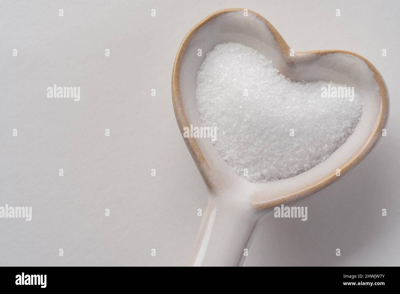 Iodized Salt on a Heart Shaped Spoon Stock Photo - Alamy